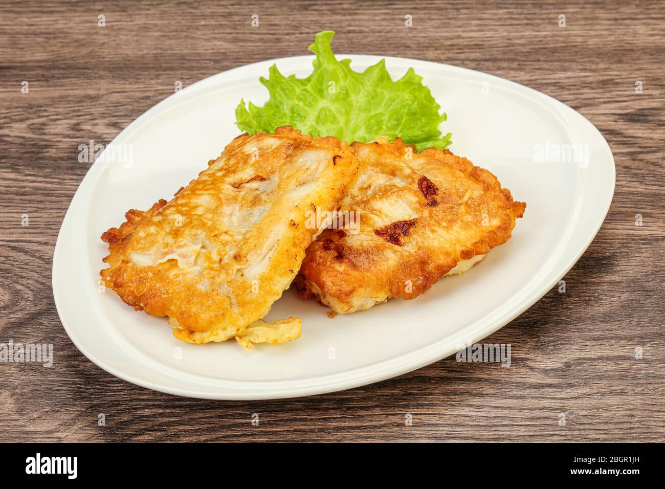 Roasted cod fish in the bread Stock Photo - Alamy