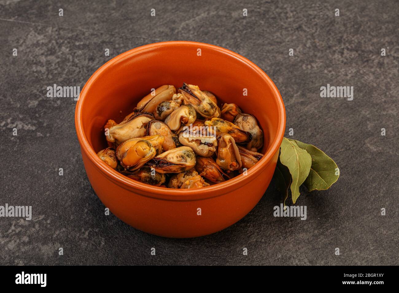Pickled mussels with spices in the bowl Stock Photo - Alamy