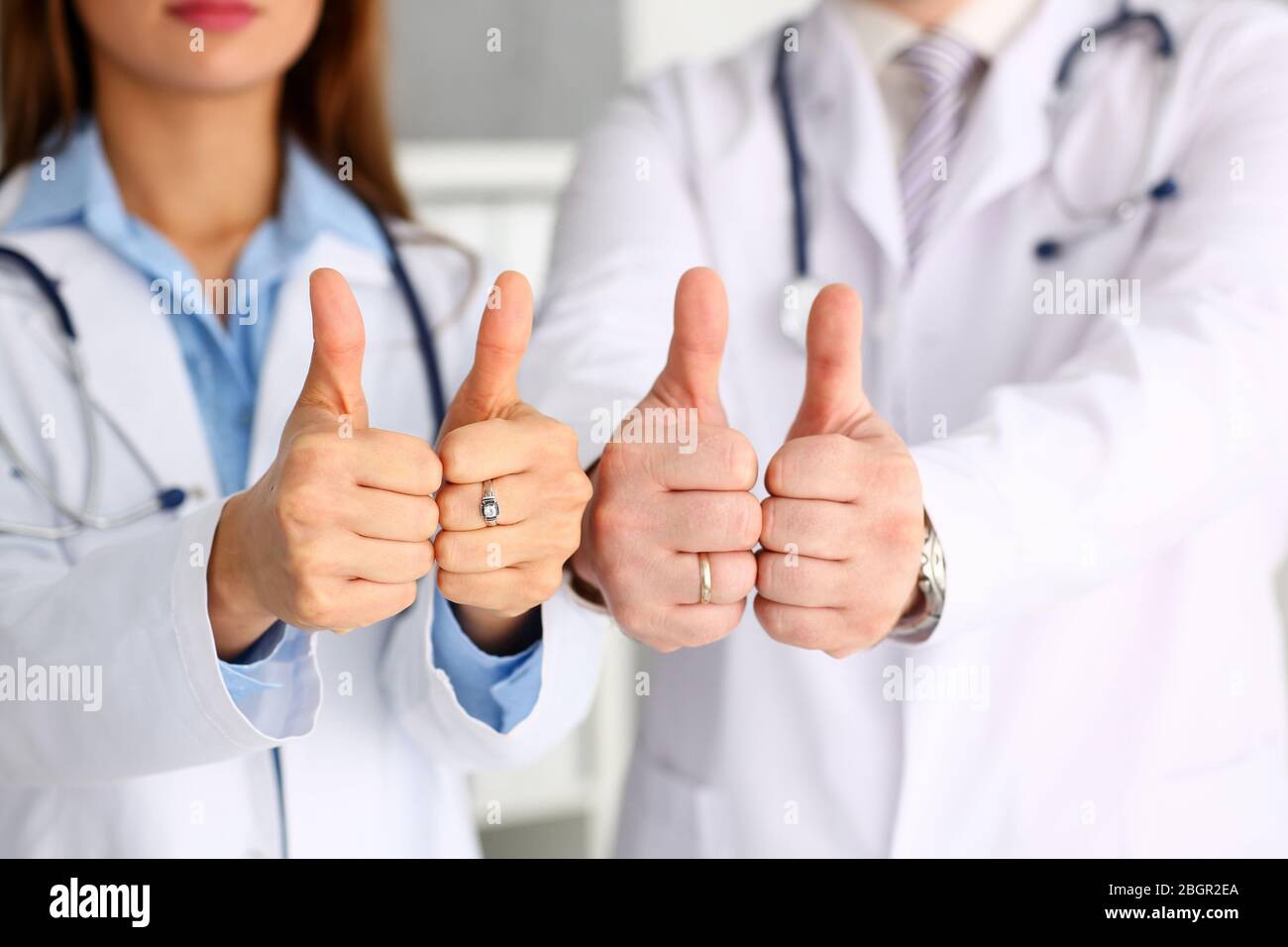 Group of doctor hands show OK or confirm sign Stock Photo - Alamy