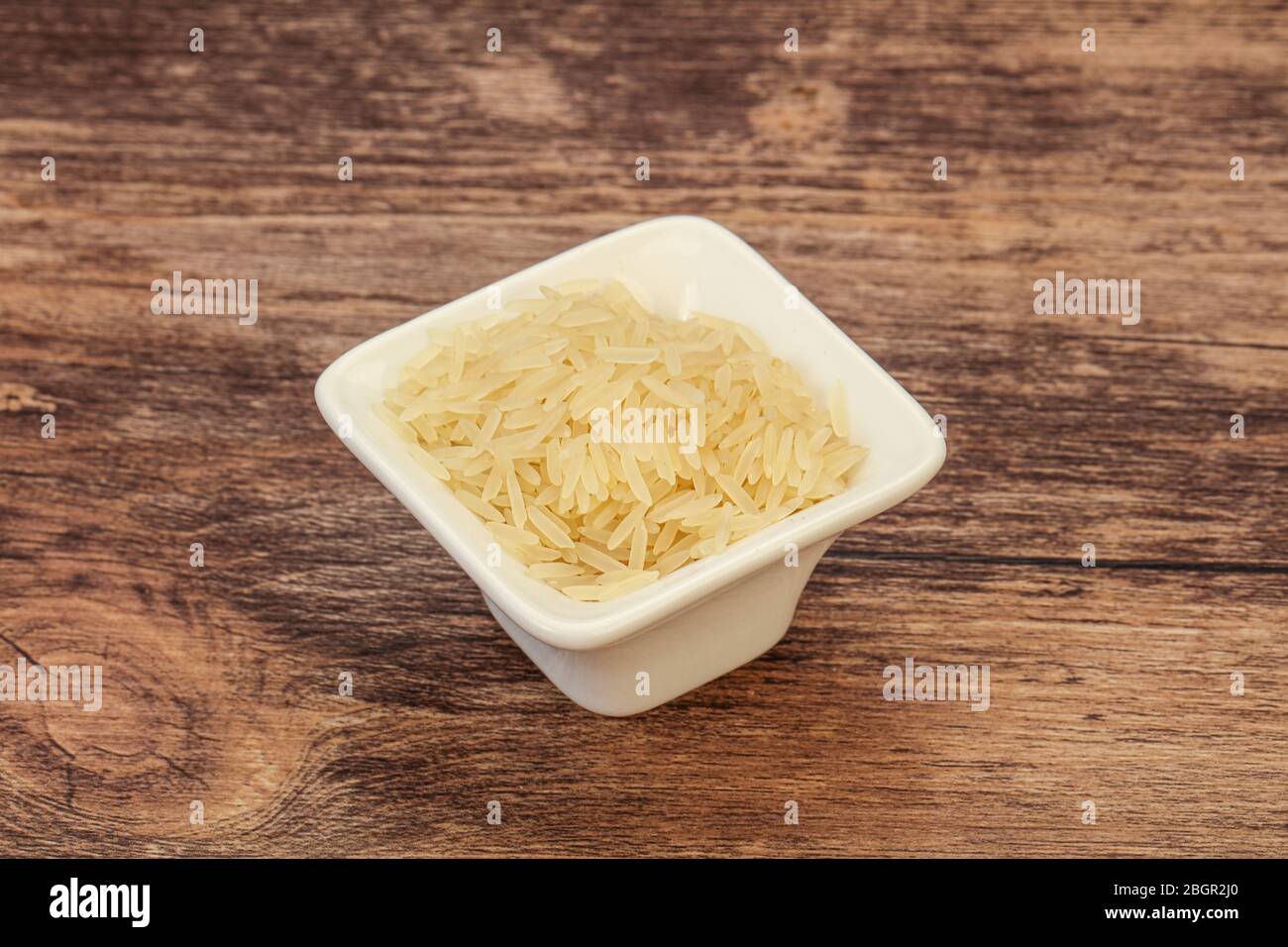 Raw Indian basmati rice in the bowl Stock Photo - Alamy