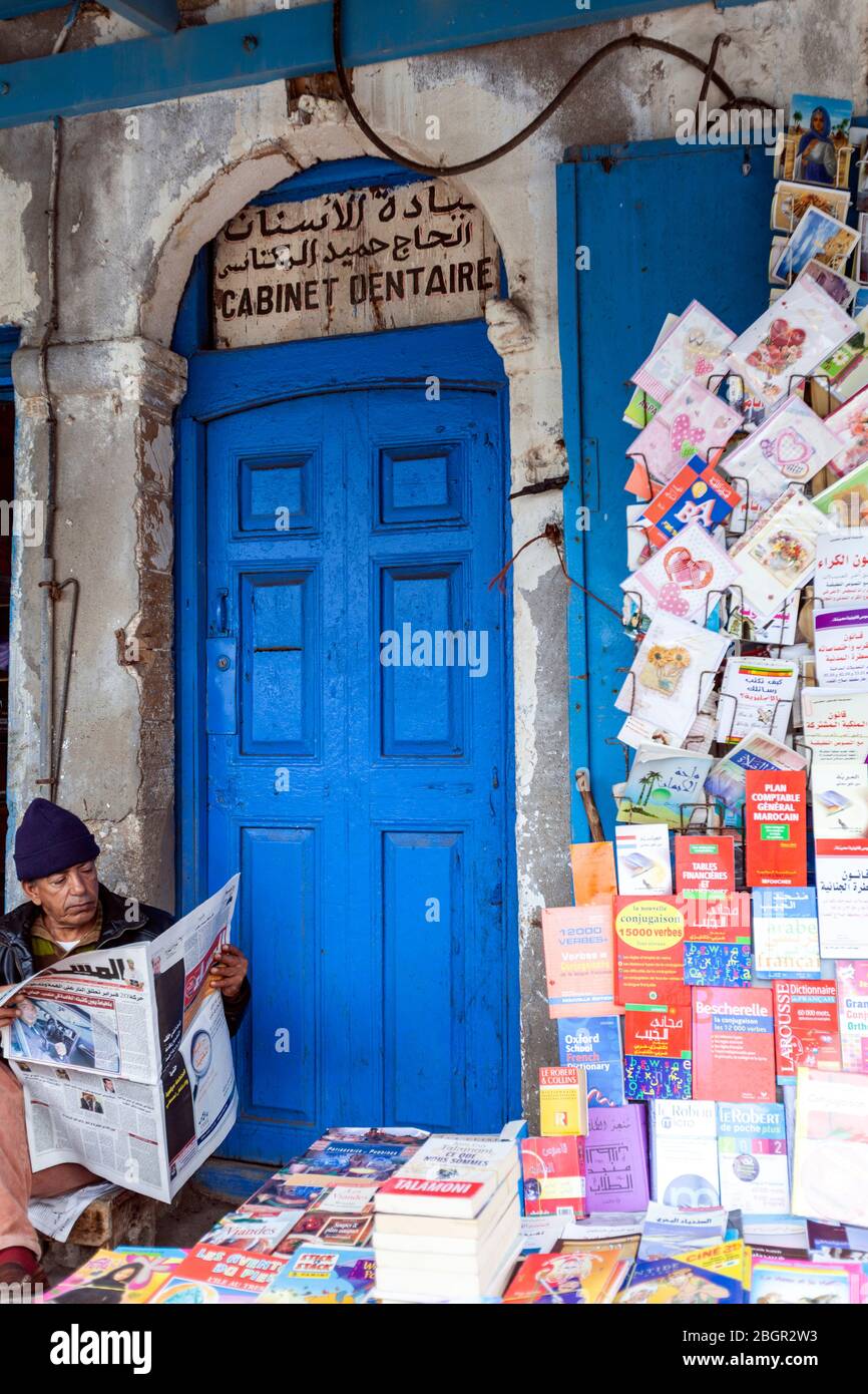 Owner reading a newspaper hi-res stock photography and images - Alamy