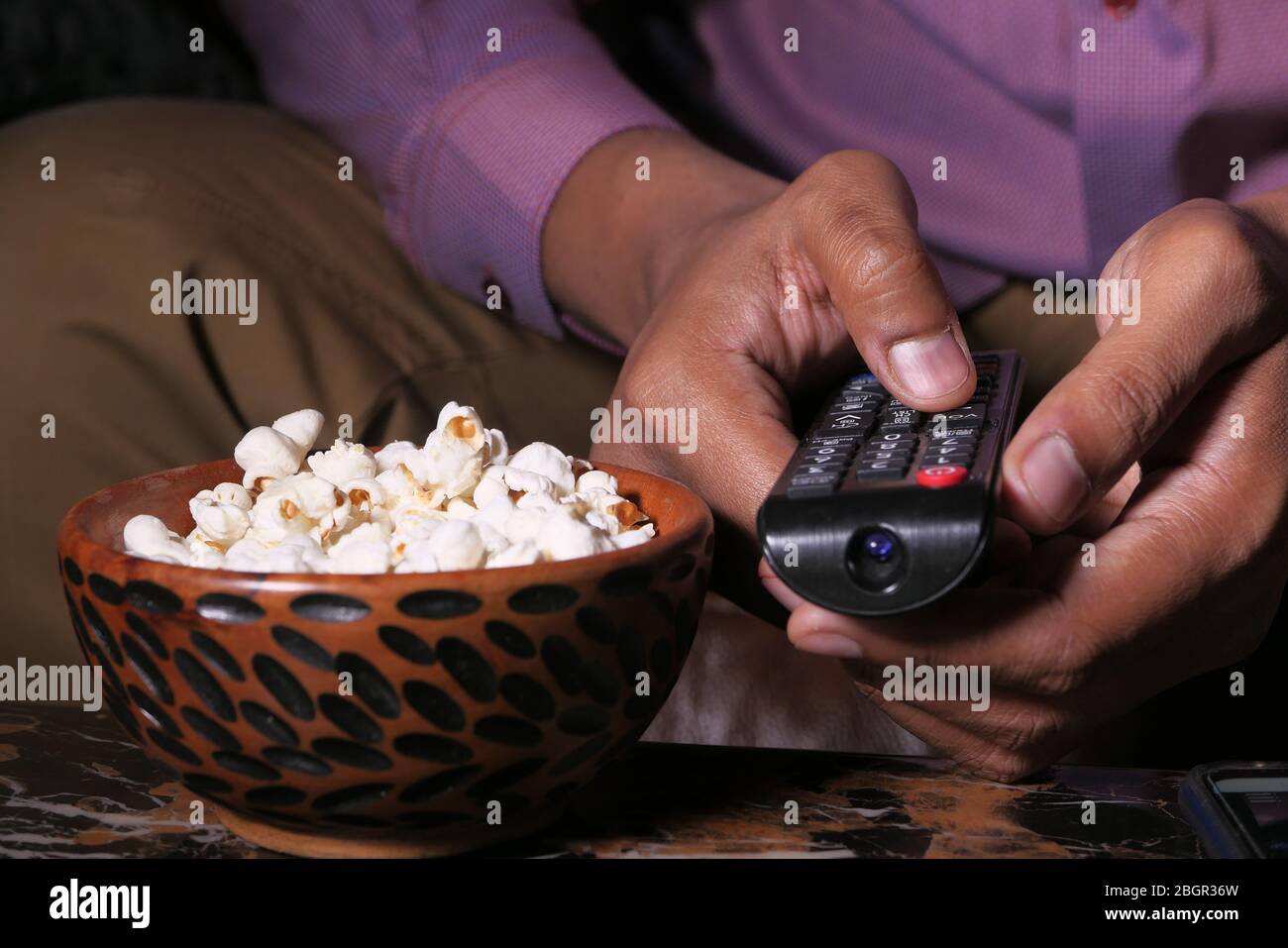 Using tv remote hi-res stock photography and images - Alamy