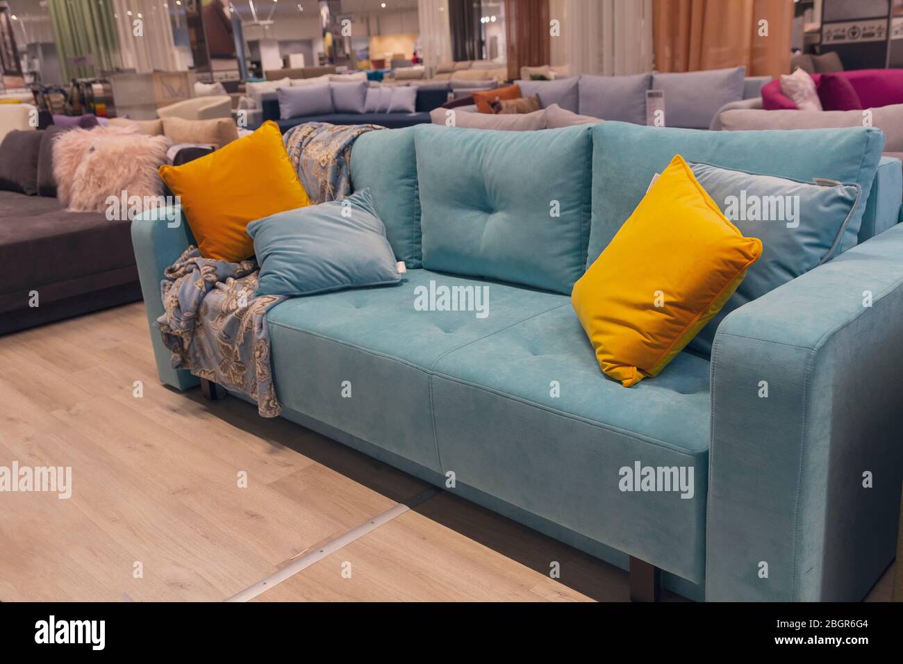 Modern sofa in the showroom of a furniture store Stock Photo - Alamy