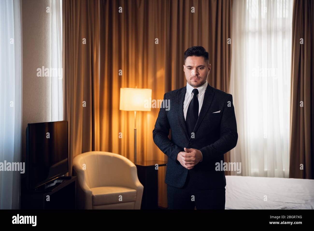 Businessman adjusting his cuffs hi-res stock photography and images - Alamy