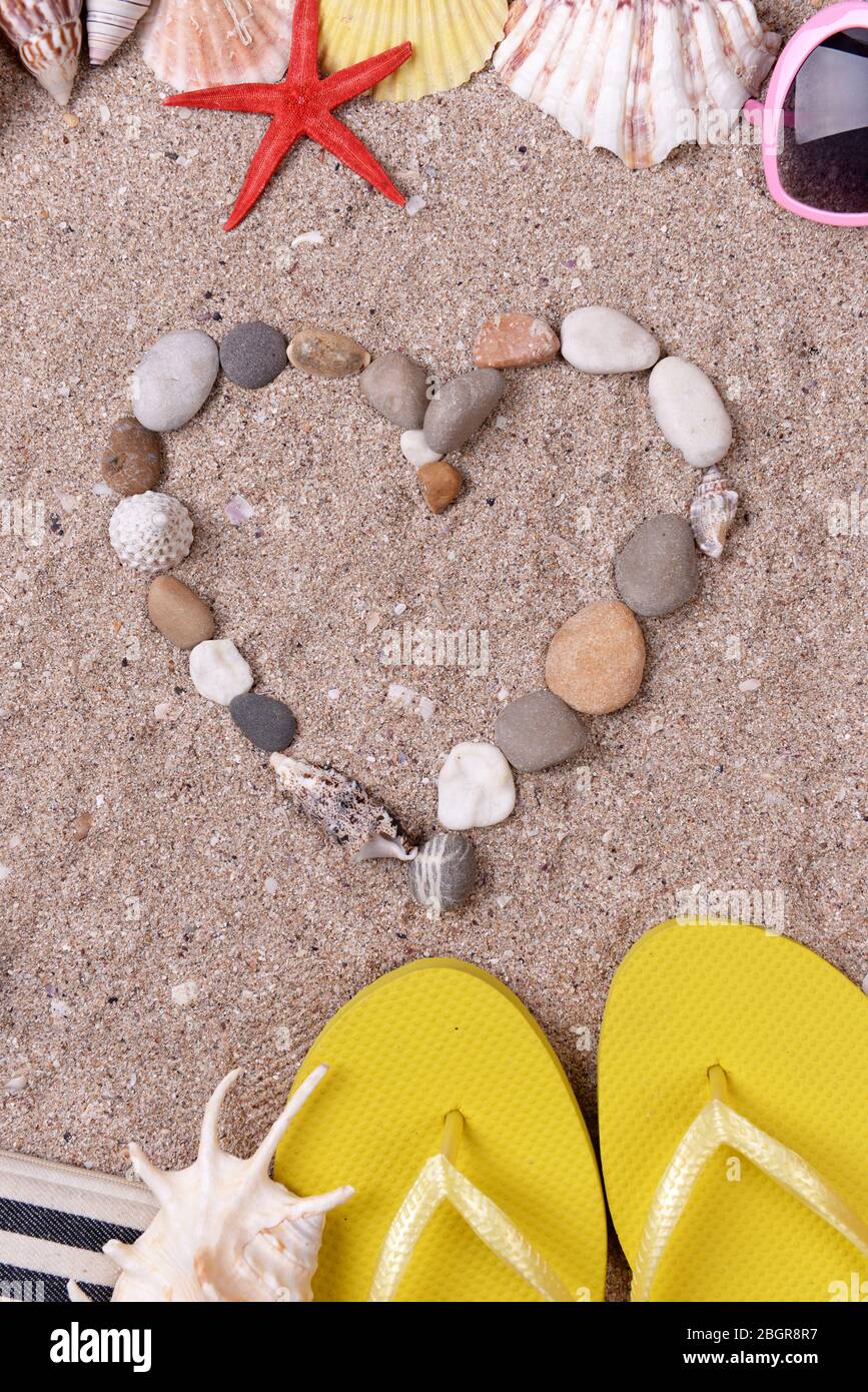 Heart made shells on beach hi-res stock photography and images - Alamy