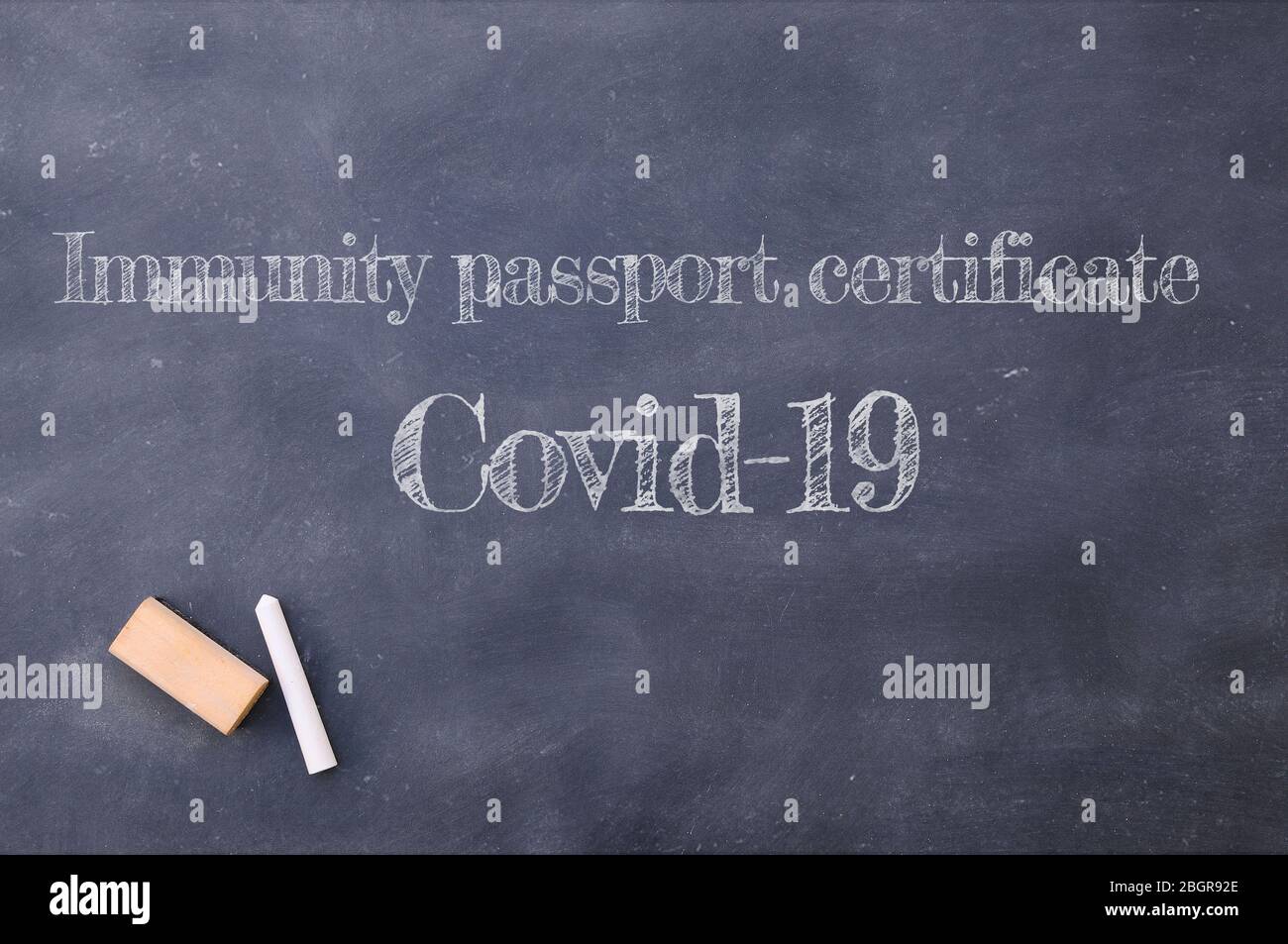 Immunity passport certificate Covid-19 written on a blackboard Stock ...
