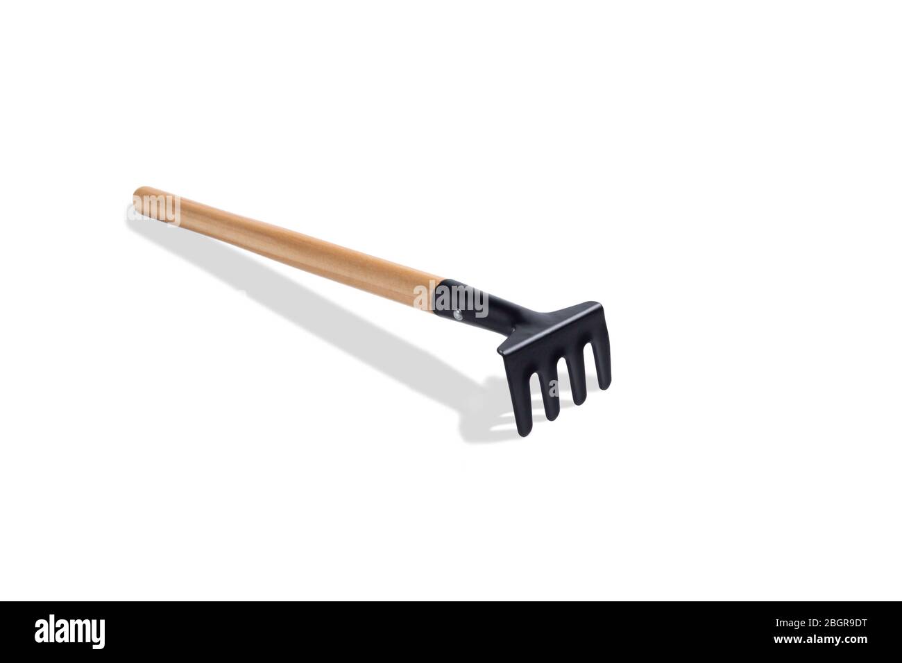 Garden rake with shadow is isolated on a white background Stock Photo ...
