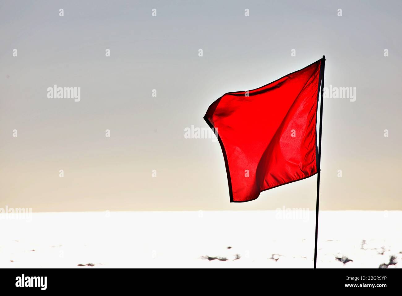 red warning flag Stock Photo - Alamy