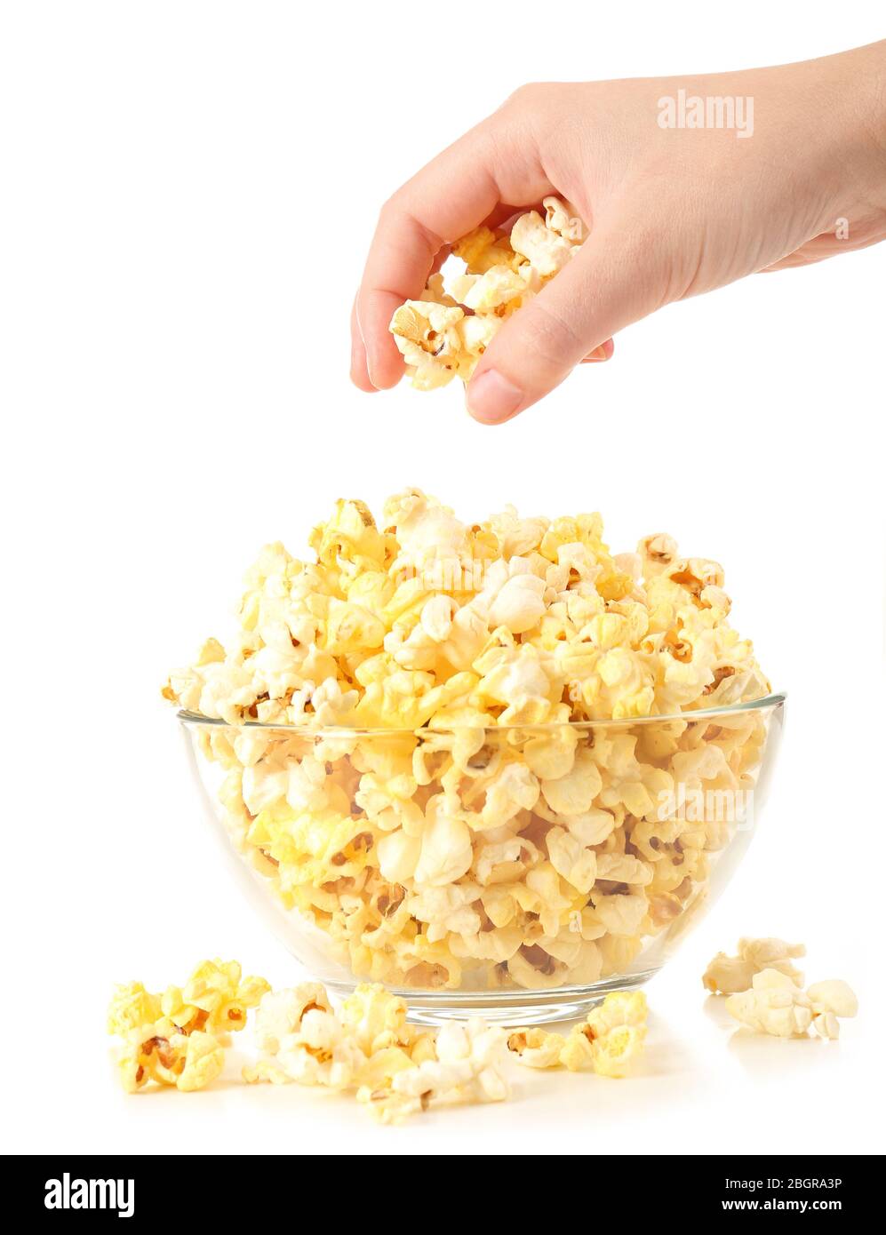 Popcorn in glass bowl isolated on white Stock Photo - Alamy