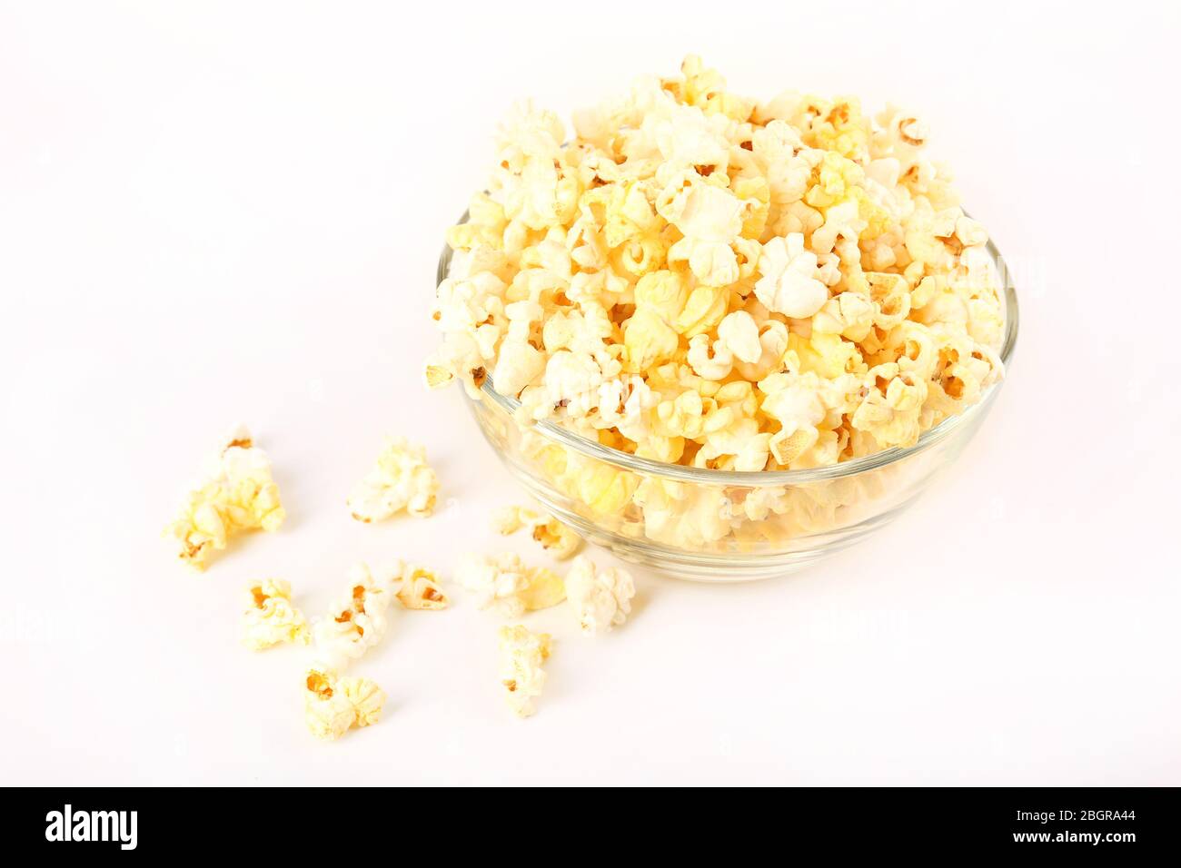 Popcorn in glass bowl isolated on white Stock Photo - Alamy