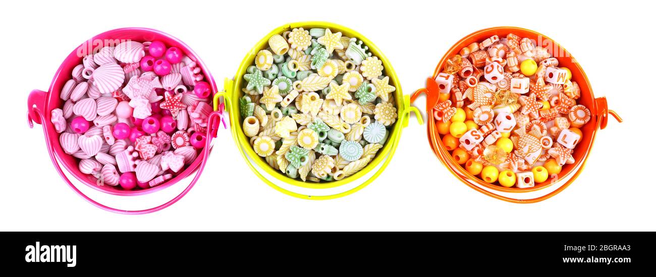 Beads in coloured metal buckets isolated on white Stock Photo - Alamy