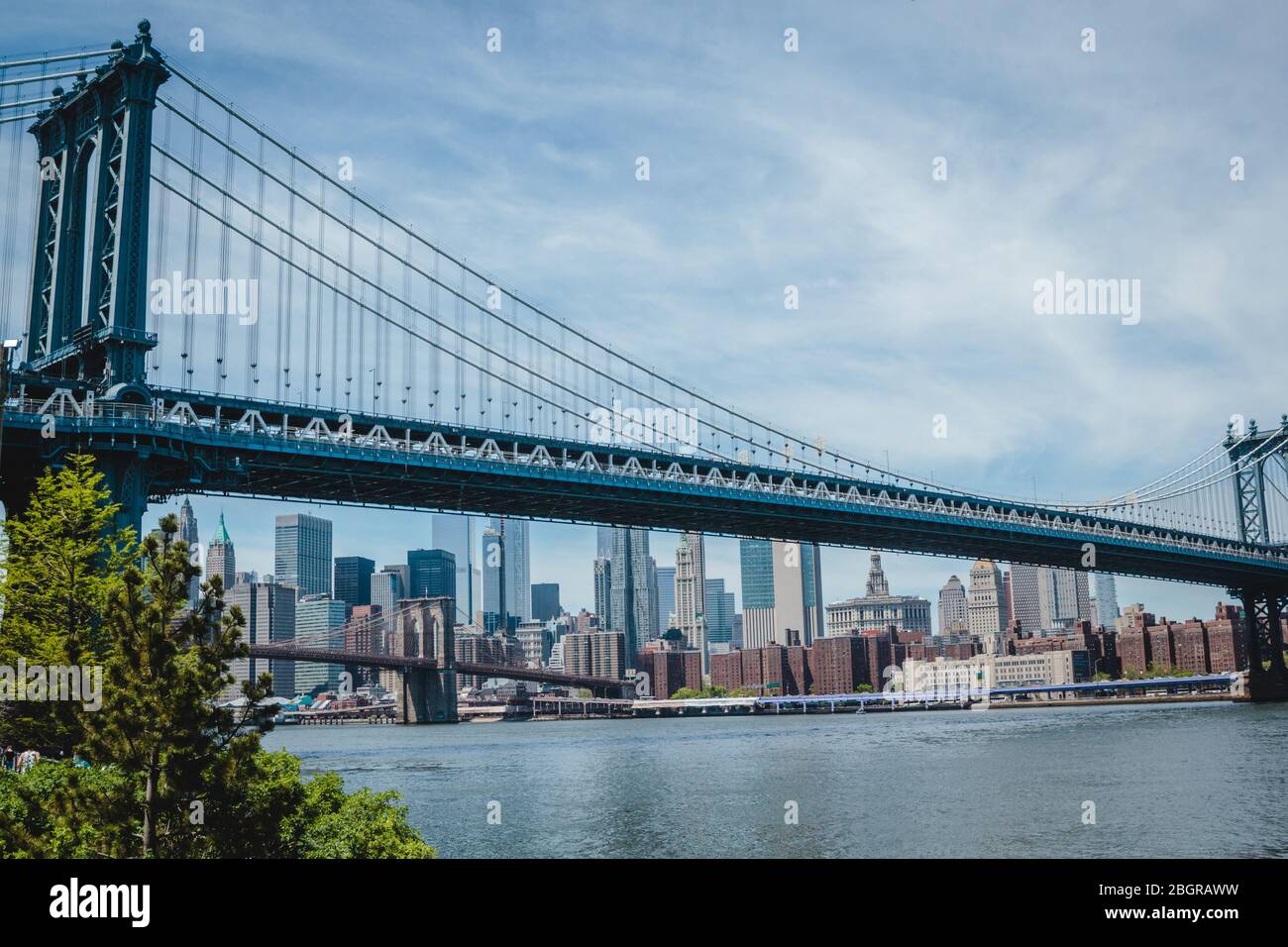 Manhattan Bridge and view on New York downtown, cityscape of Manhattan ...