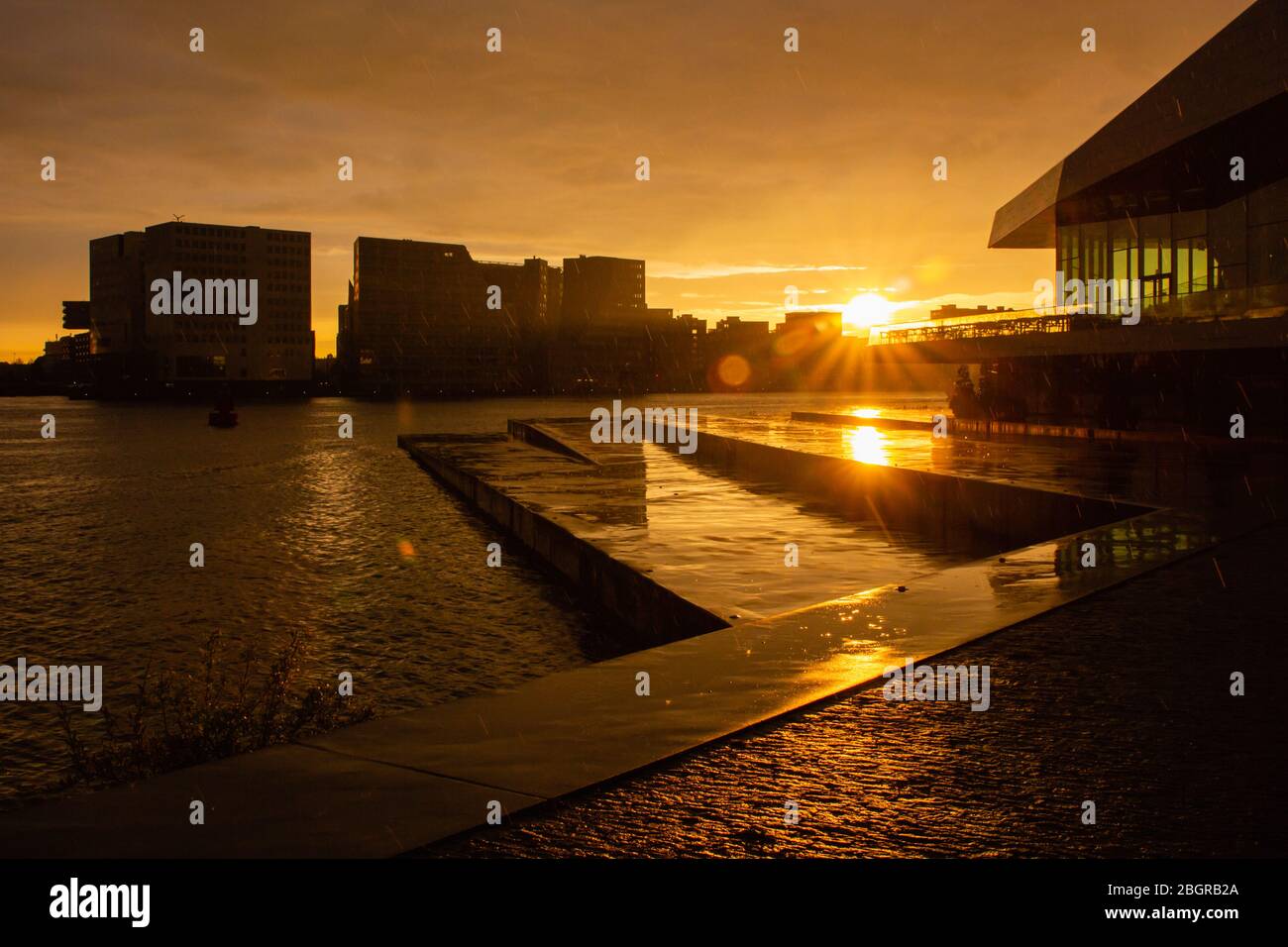 Spring sunset rain near Eye Film Museum in Amsterdam, iconic modern ...