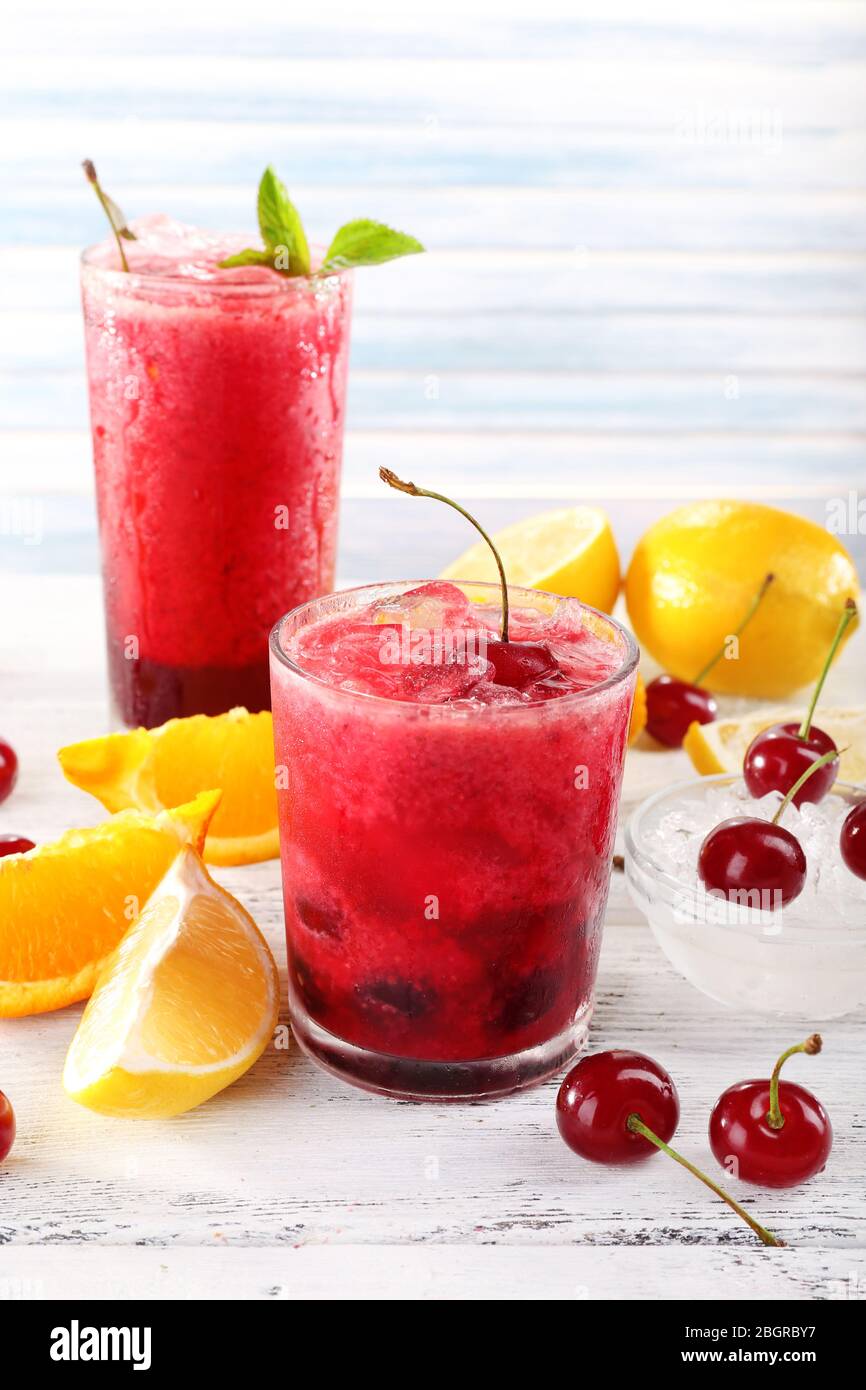Fresh cold cherry cocktail with mint and lemon Stock Photo - Alamy