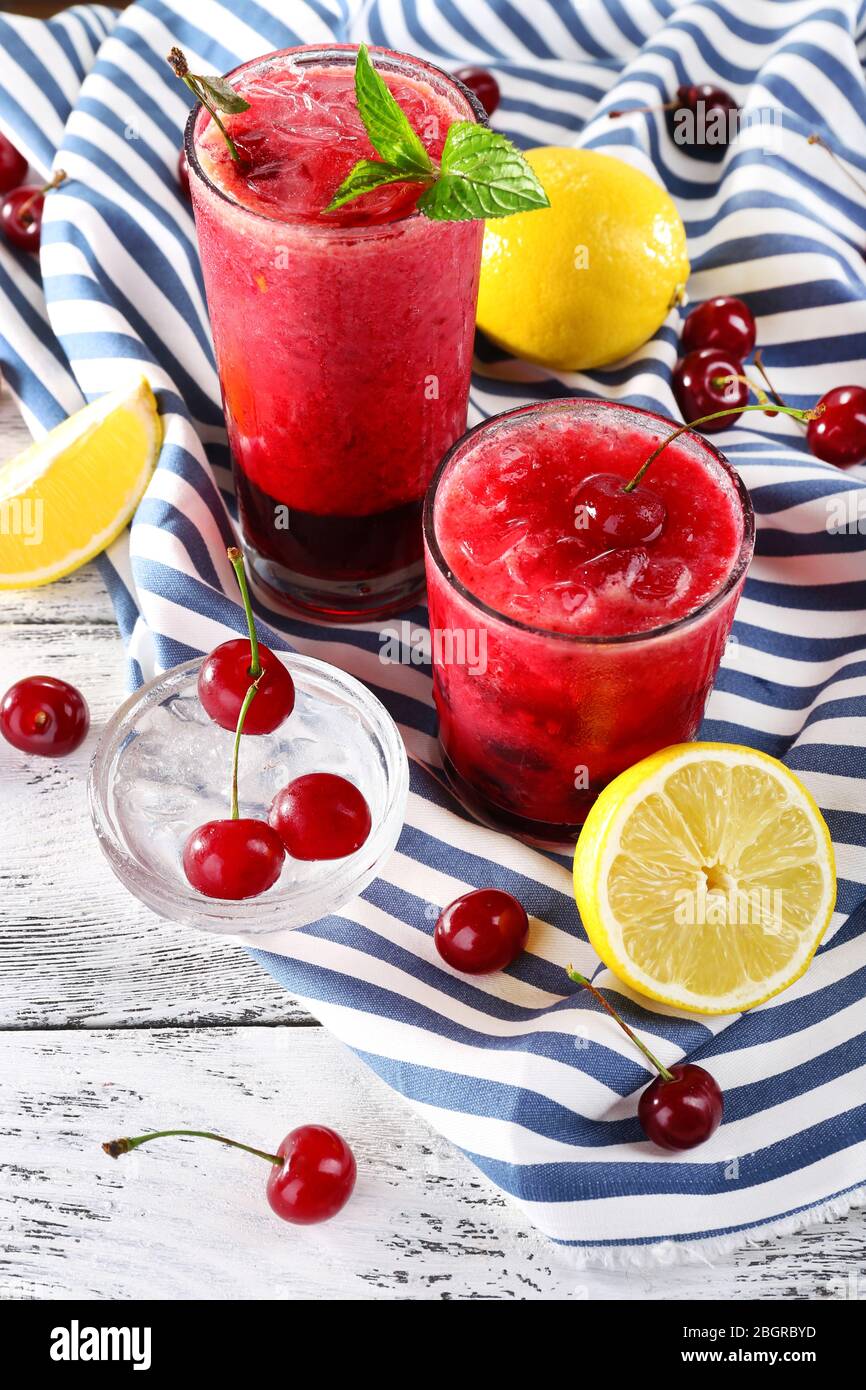 Fresh cold cherry cocktail with mint and lemon Stock Photo - Alamy