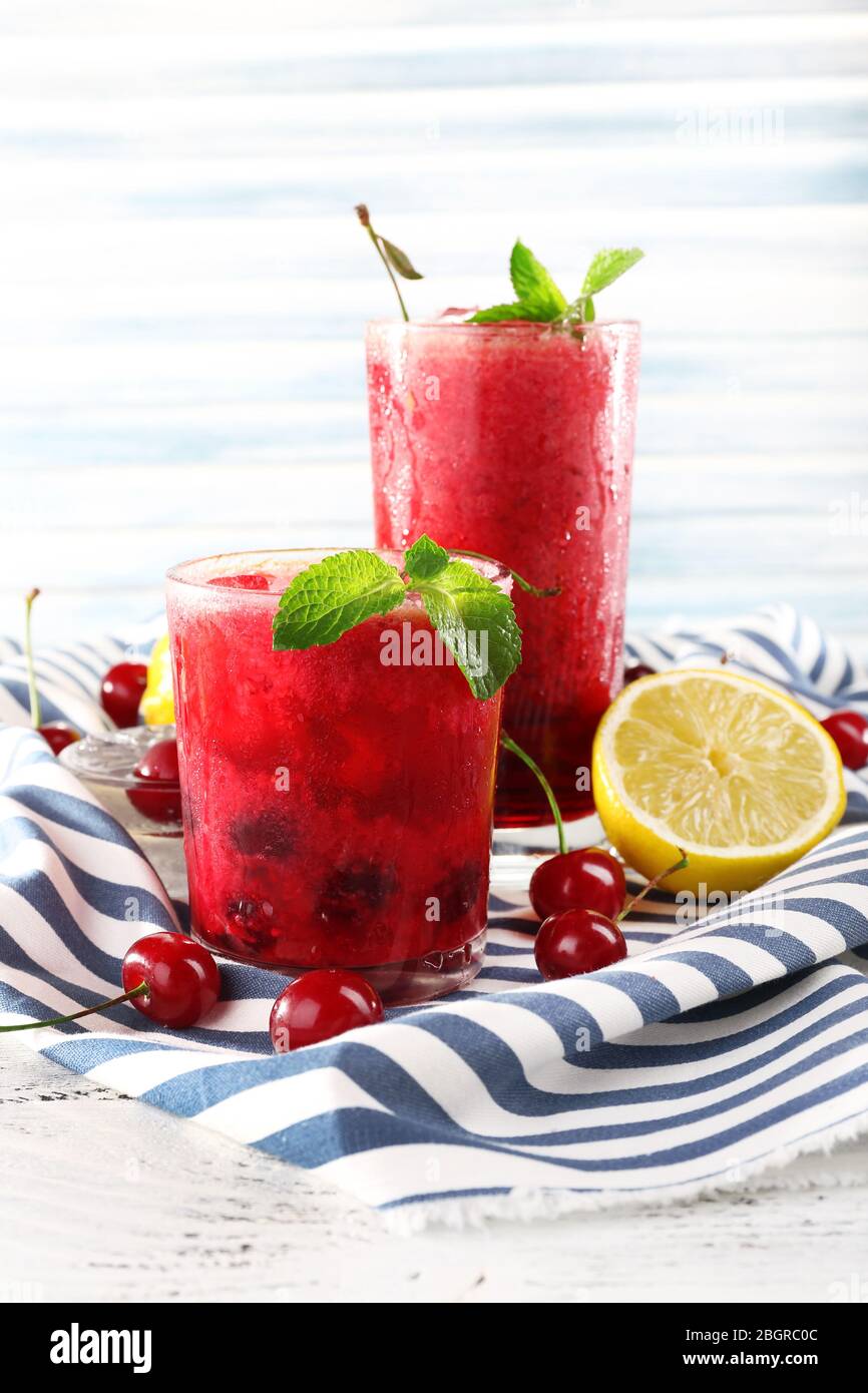 Fresh cold cherry cocktail with mint and lemon Stock Photo - Alamy