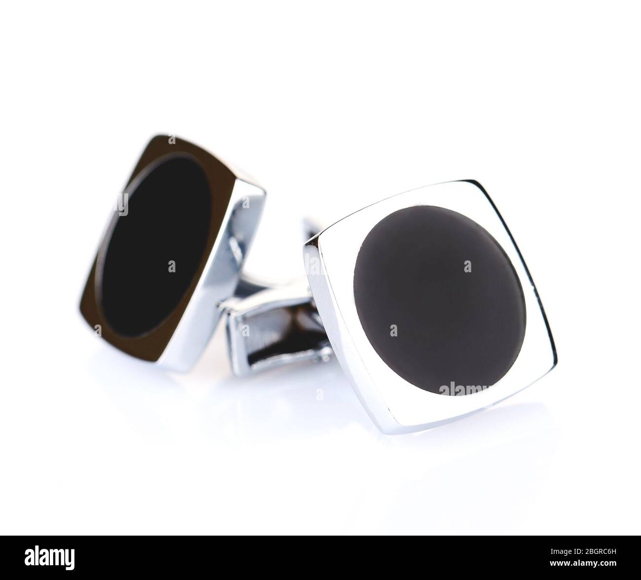 Pair of cuff links isolated on white Stock Photo - Alamy