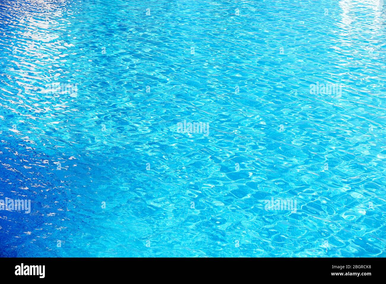Blue water in swimming pool Stock Photo - Alamy