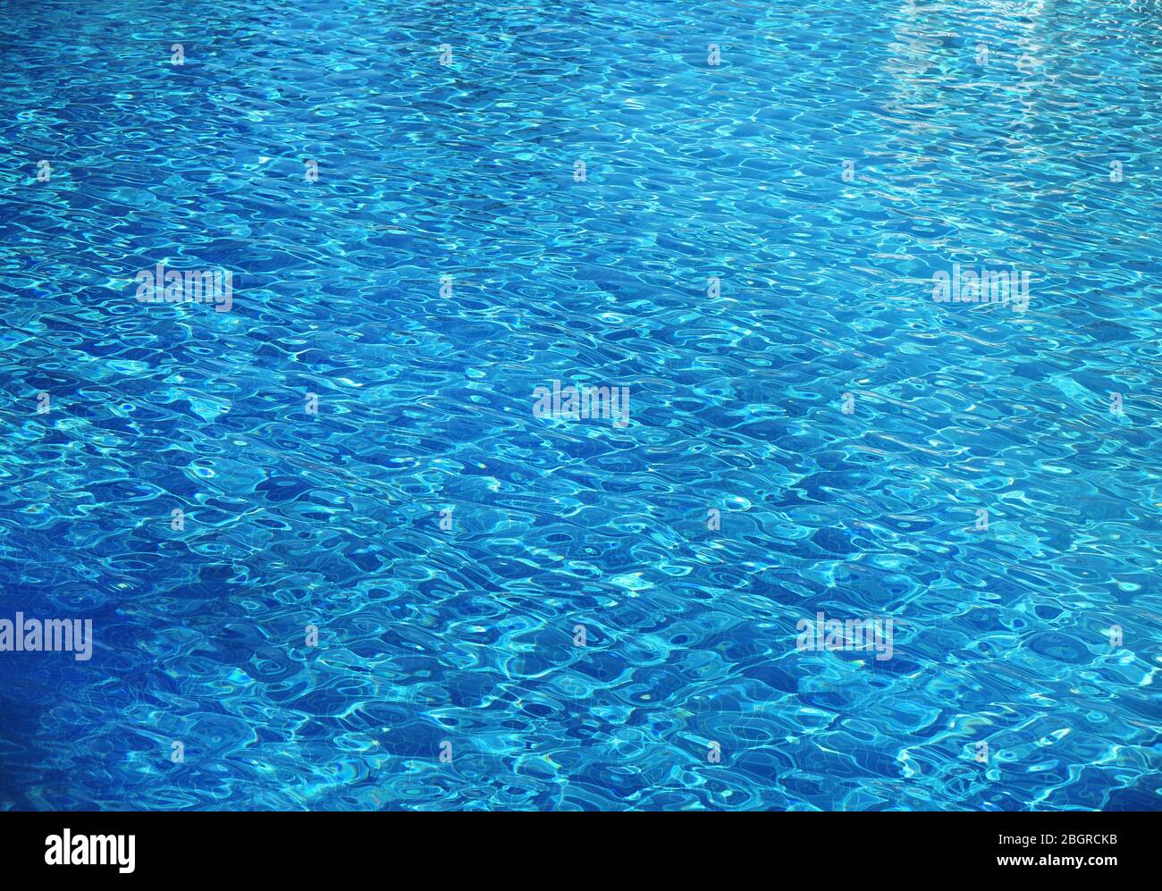 Blue water in swimming pool Stock Photo - Alamy