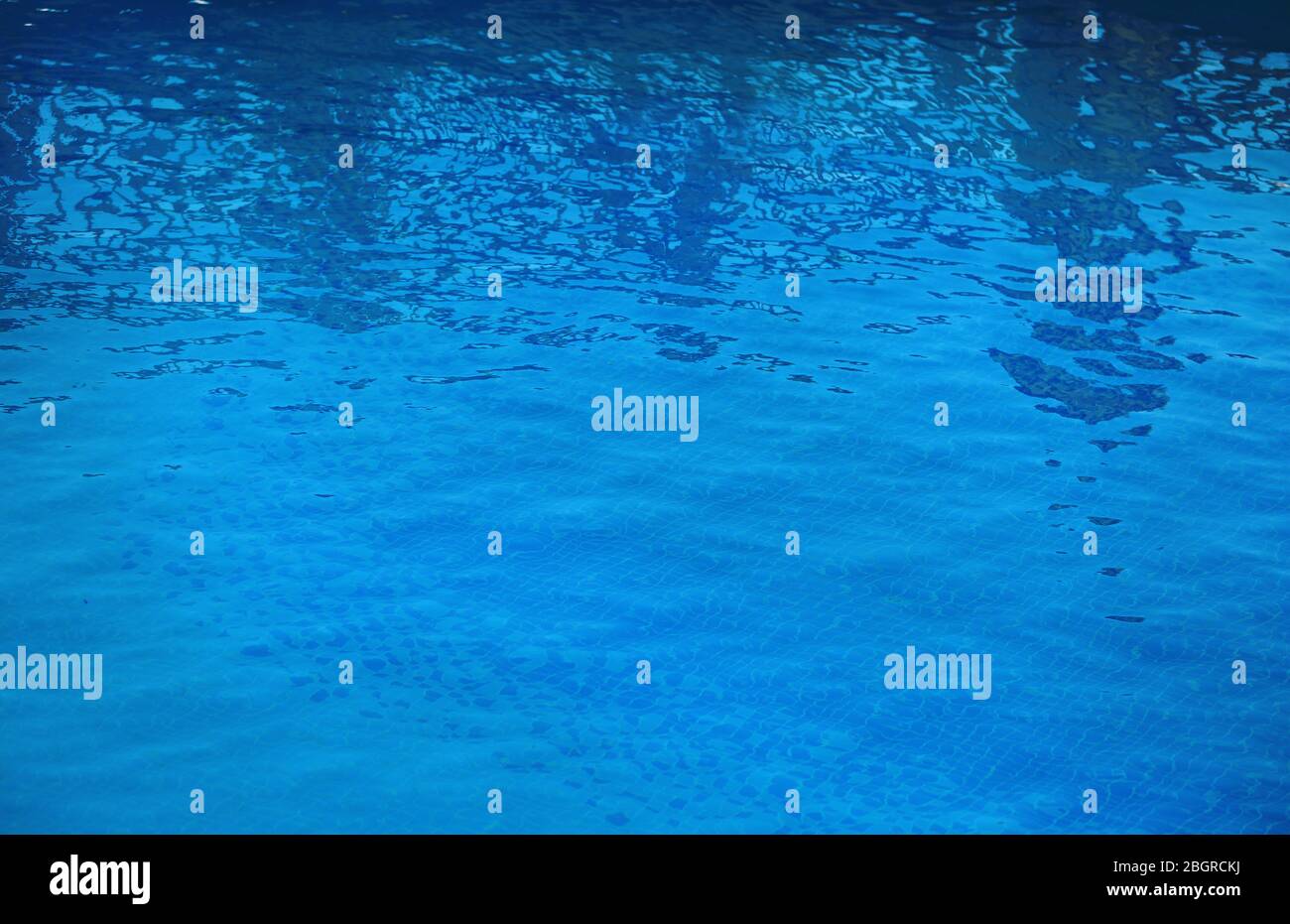 Blue water in swimming pool Stock Photo - Alamy