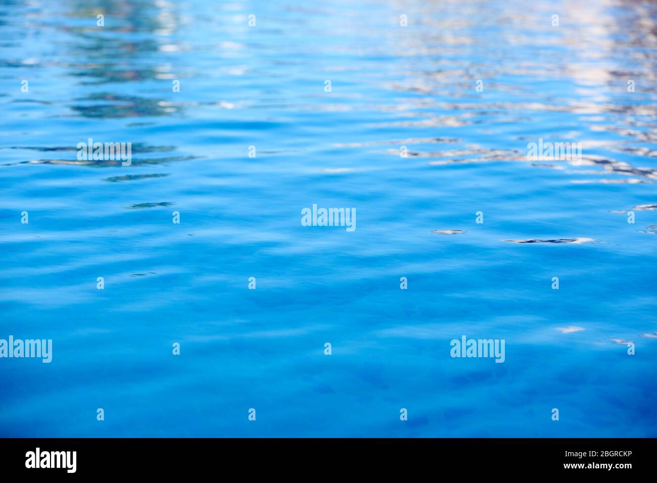 Blue water in swimming pool Stock Photo - Alamy