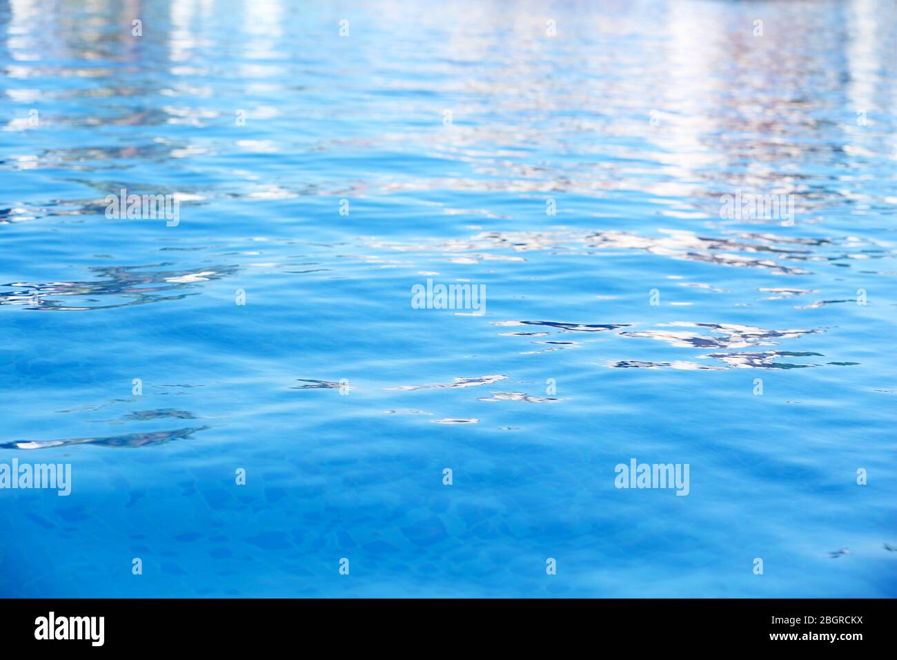 Blue water in swimming pool Stock Photo - Alamy