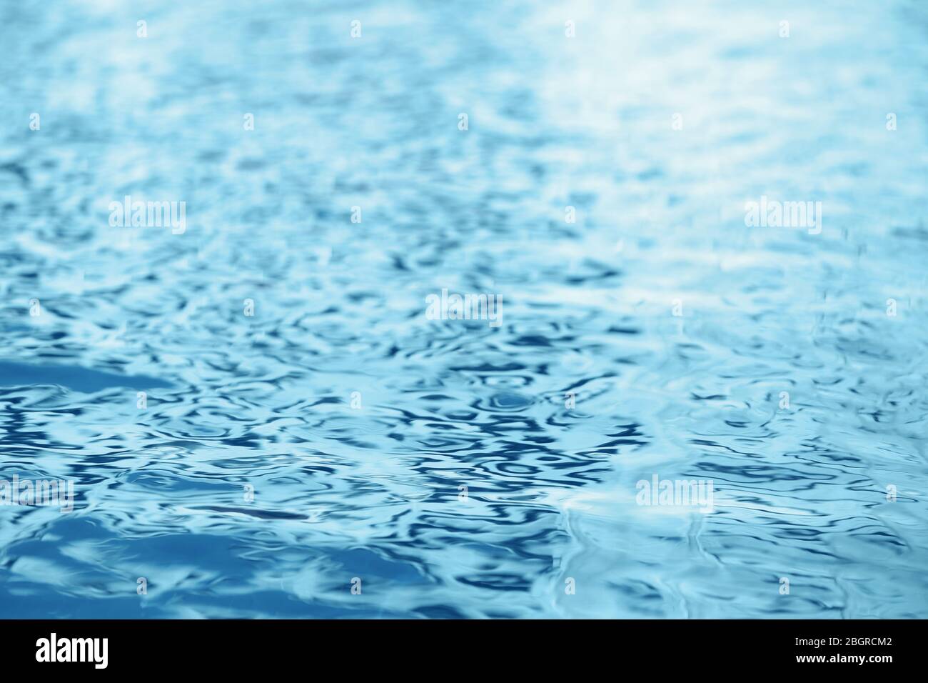 Blue water in swimming pool Stock Photo - Alamy