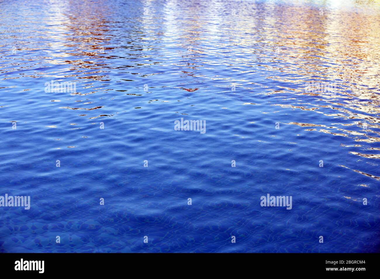 Blue water in swimming pool Stock Photo - Alamy