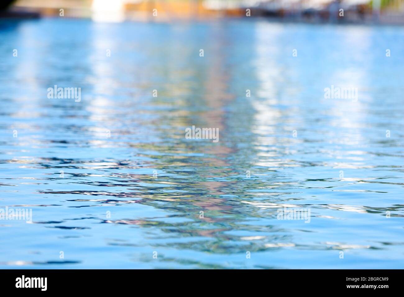 Blue water in swimming pool Stock Photo - Alamy