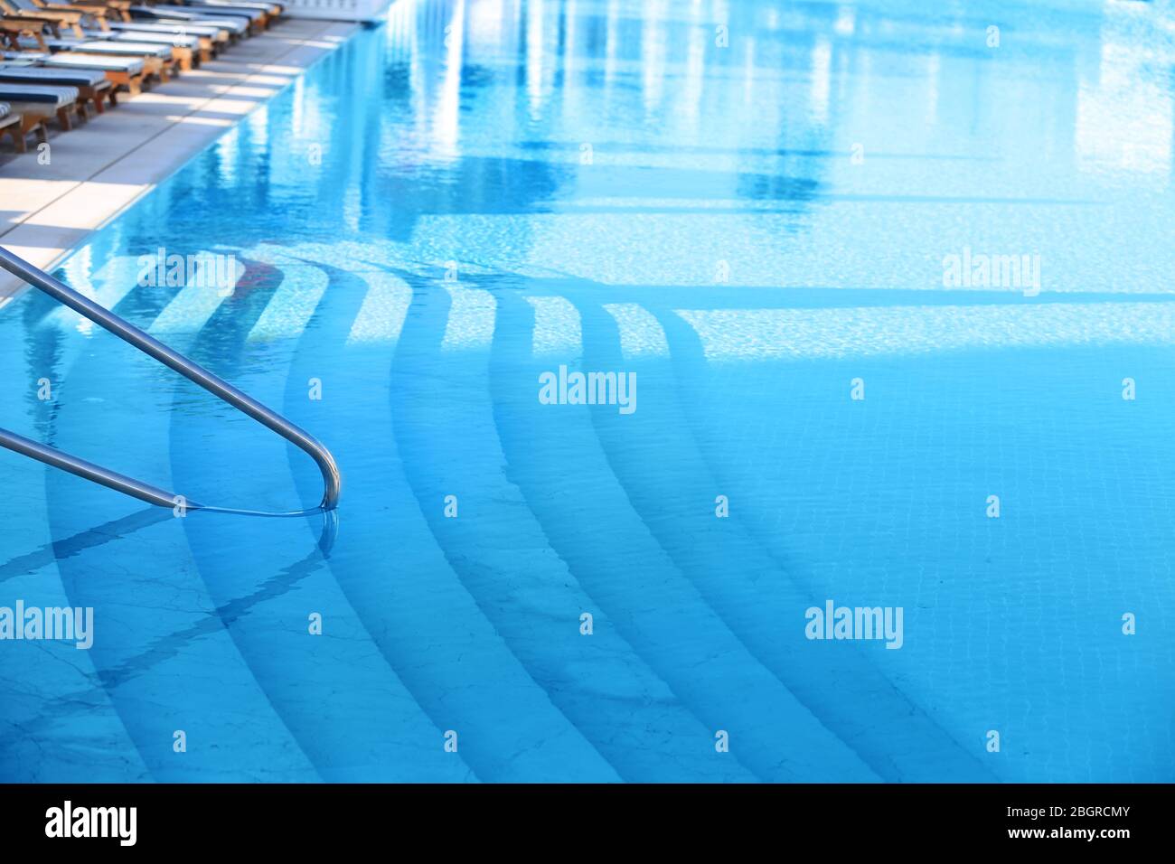 Hotel swimming pool Stock Photo - Alamy