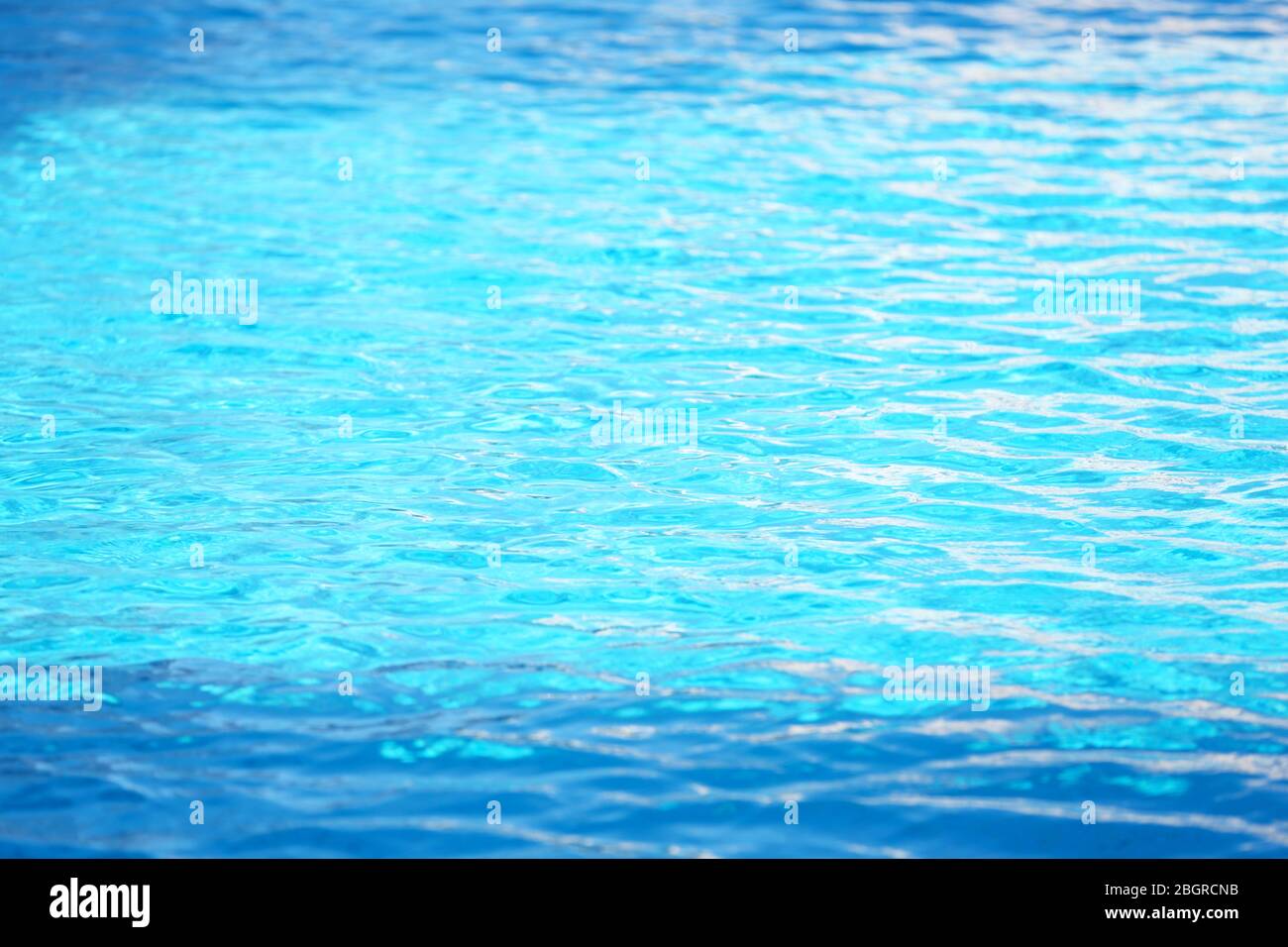 Blue water in swimming pool Stock Photo - Alamy