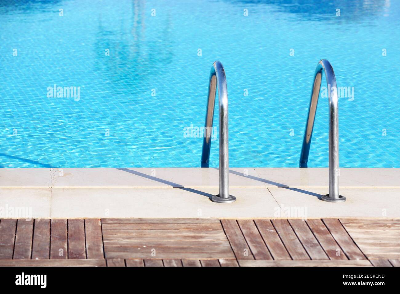 Hotel swimming pool Stock Photo - Alamy