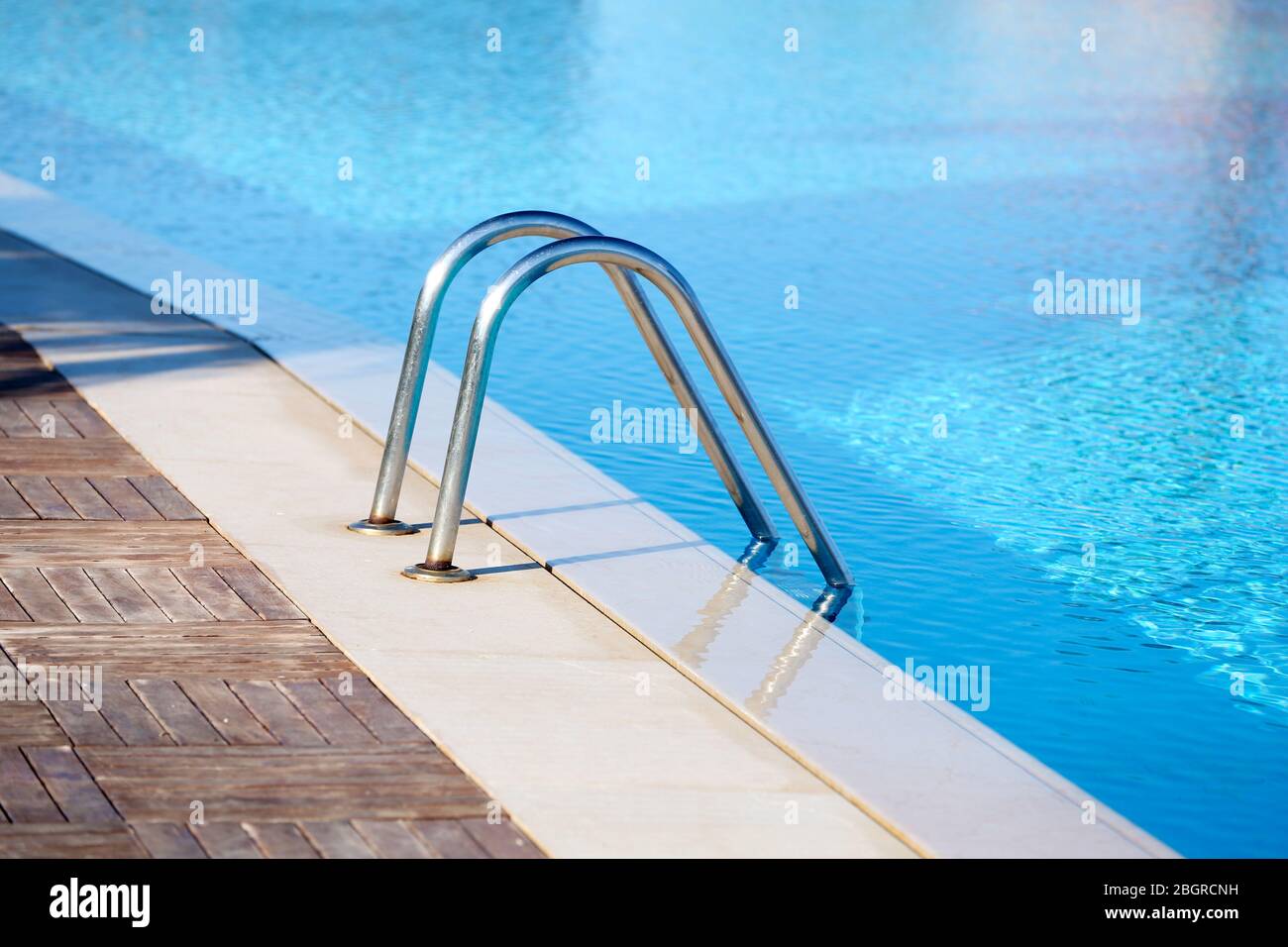 Hotel swimming pool Stock Photo - Alamy