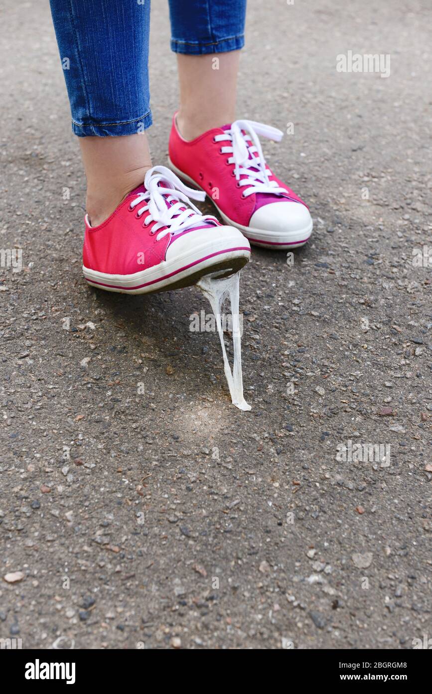 Foot stuck into chewing gum on street Stock Photo - Alamy
