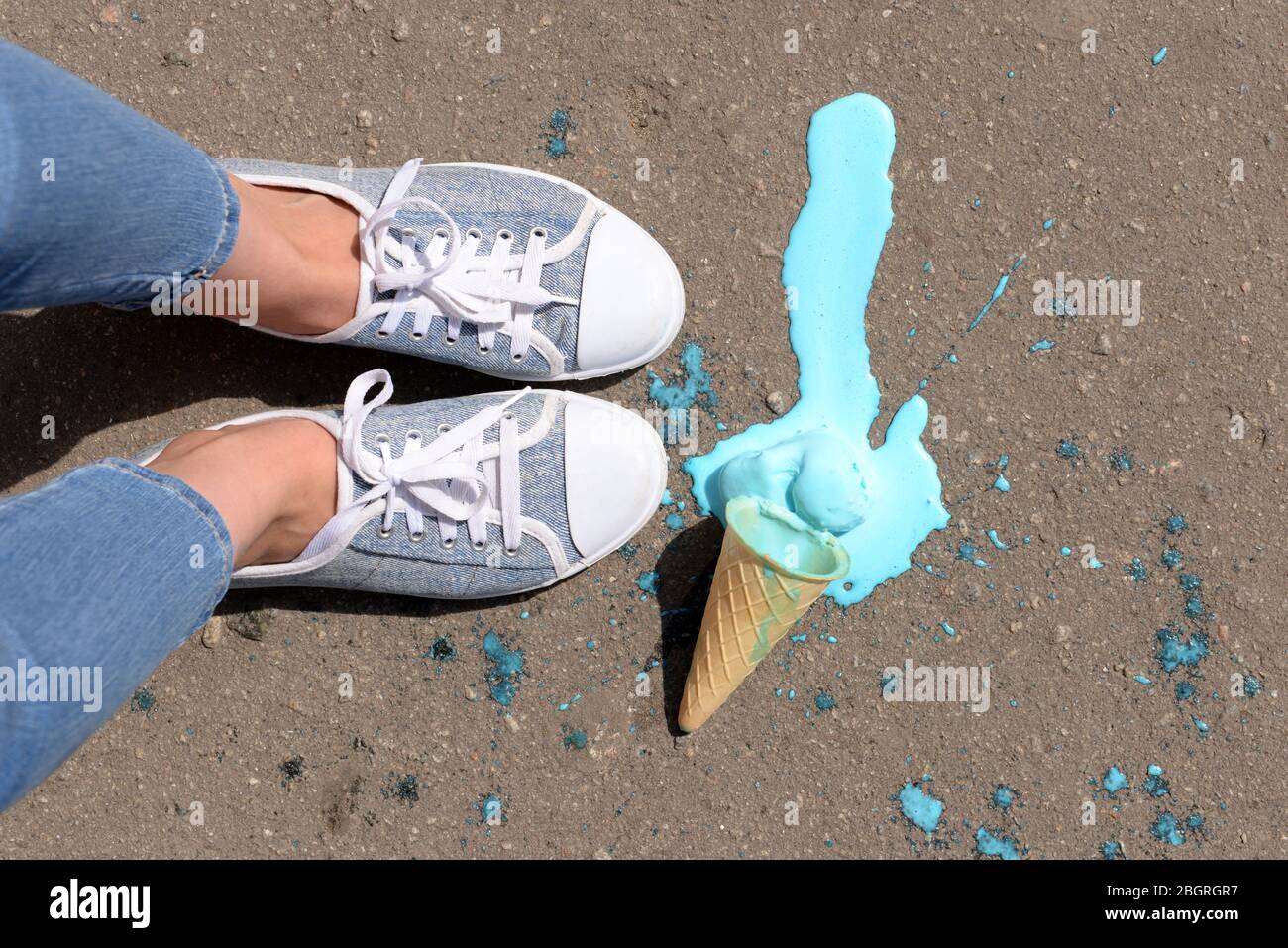 Ice cream fell on asphalt top view Stock Photo - Alamy