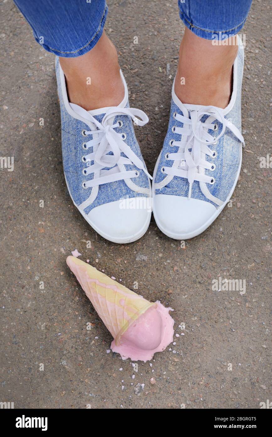 Ice cream fell on asphalt top view Stock Photo - Alamy