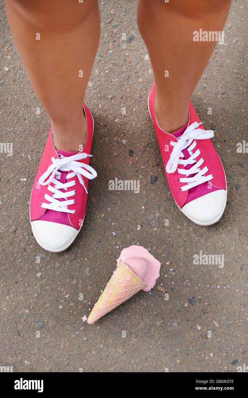 Ice cream fell on asphalt top view Stock Photo - Alamy