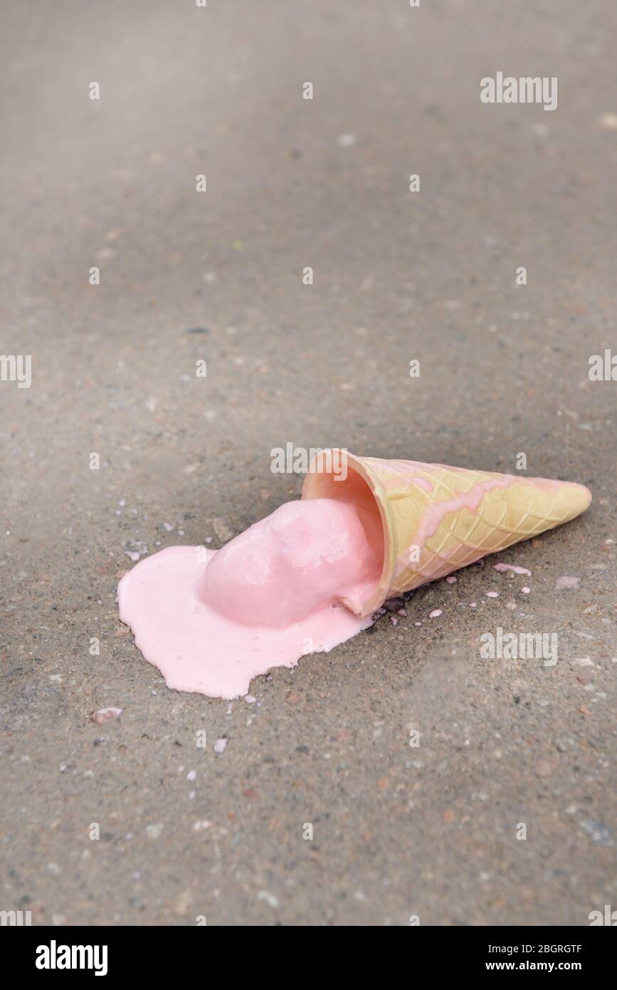 Ice cream fell on asphalt top view Stock Photo - Alamy