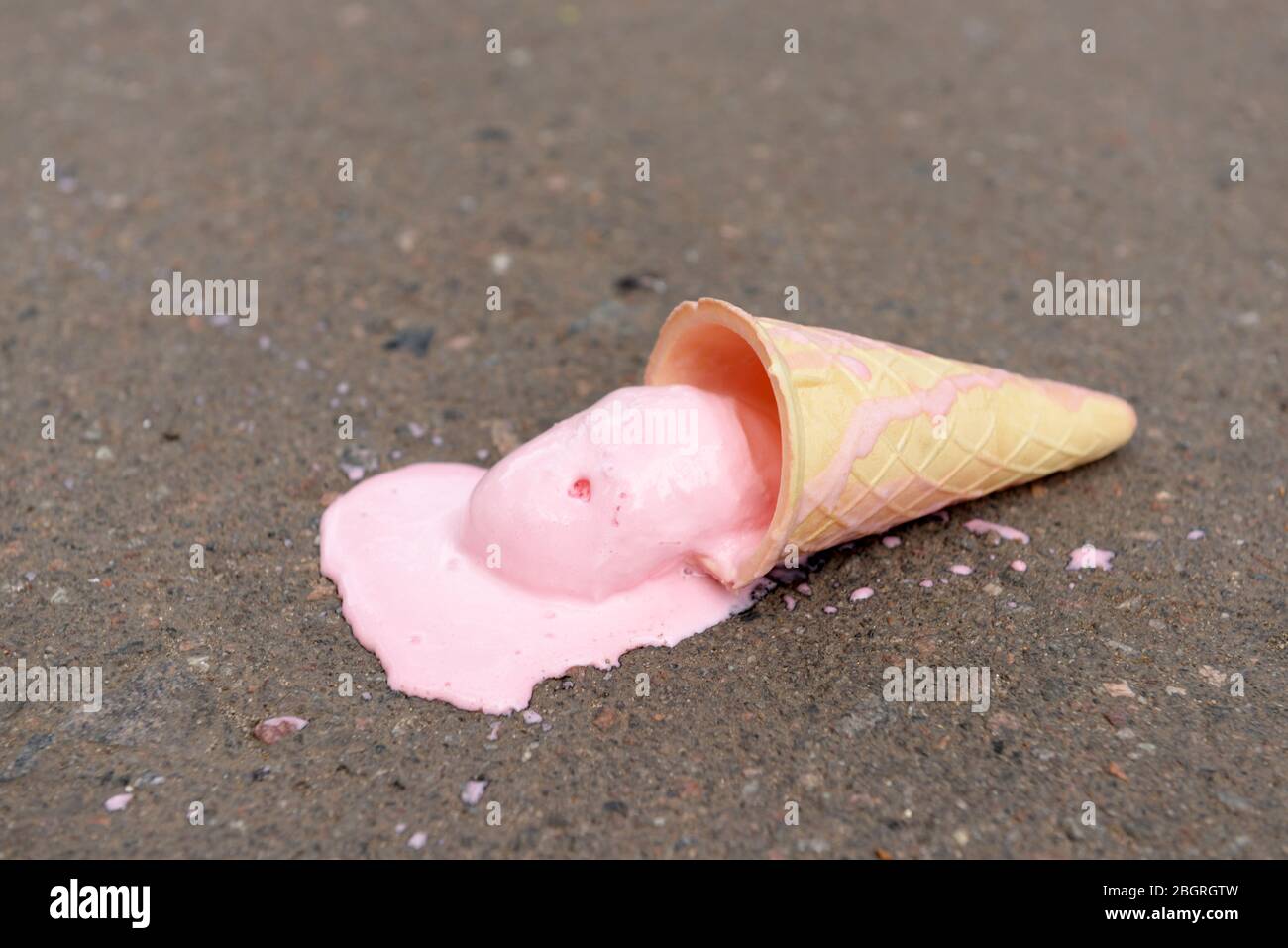 Ice cream fell on asphalt top view Stock Photo - Alamy