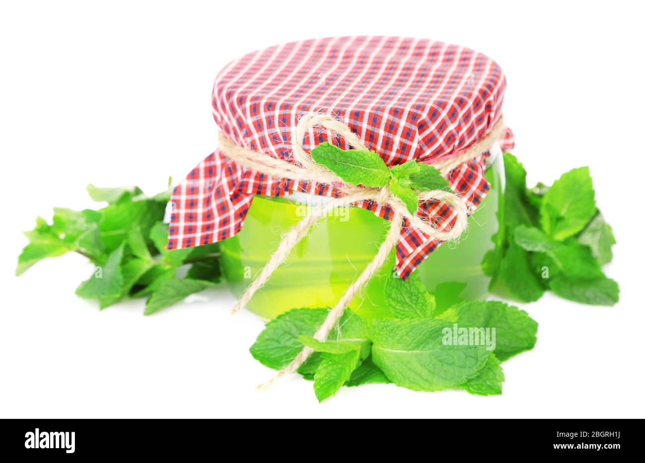 Homemade mint jelly in glass jar, isolated on white Stock Photo - Alamy