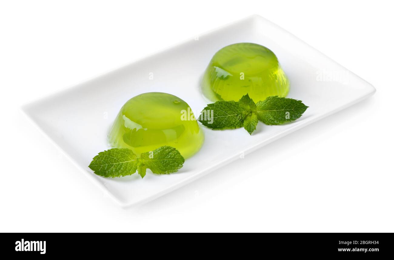 Green jelly with mint leaves isolated on white Stock Photo - Alamy