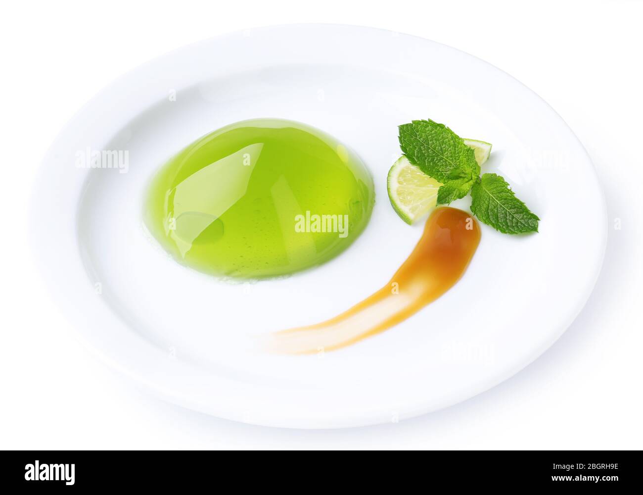 Green jelly with mint leaves isolated on white Stock Photo - Alamy