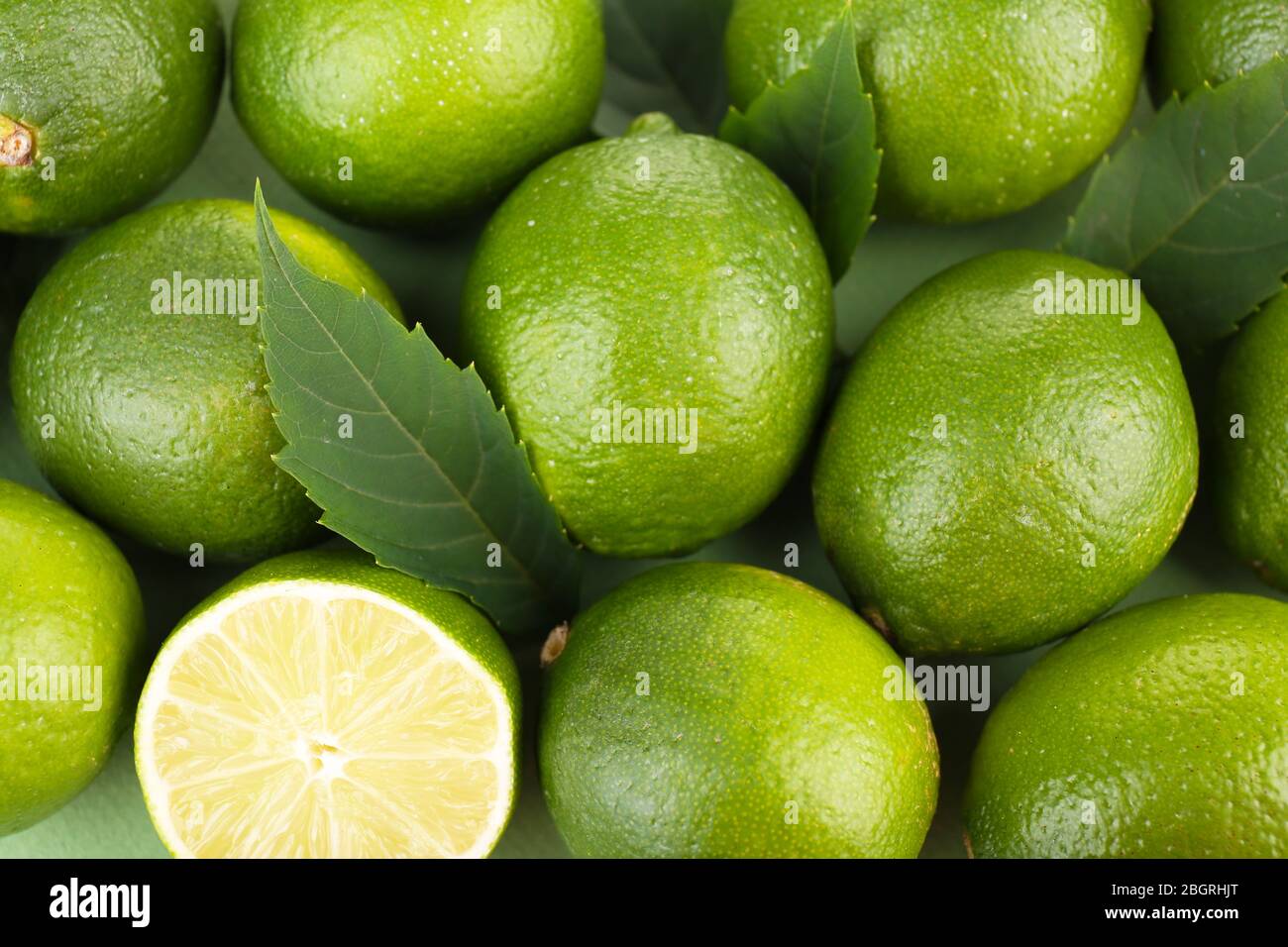 Fresh juicy limes, close up Stock Photo - Alamy