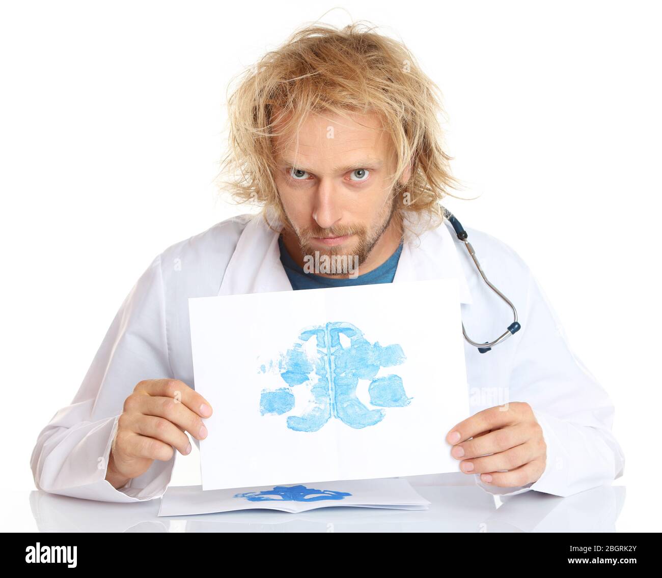 Funny psychotherapist holding Rorschach test Stock Photo - Alamy