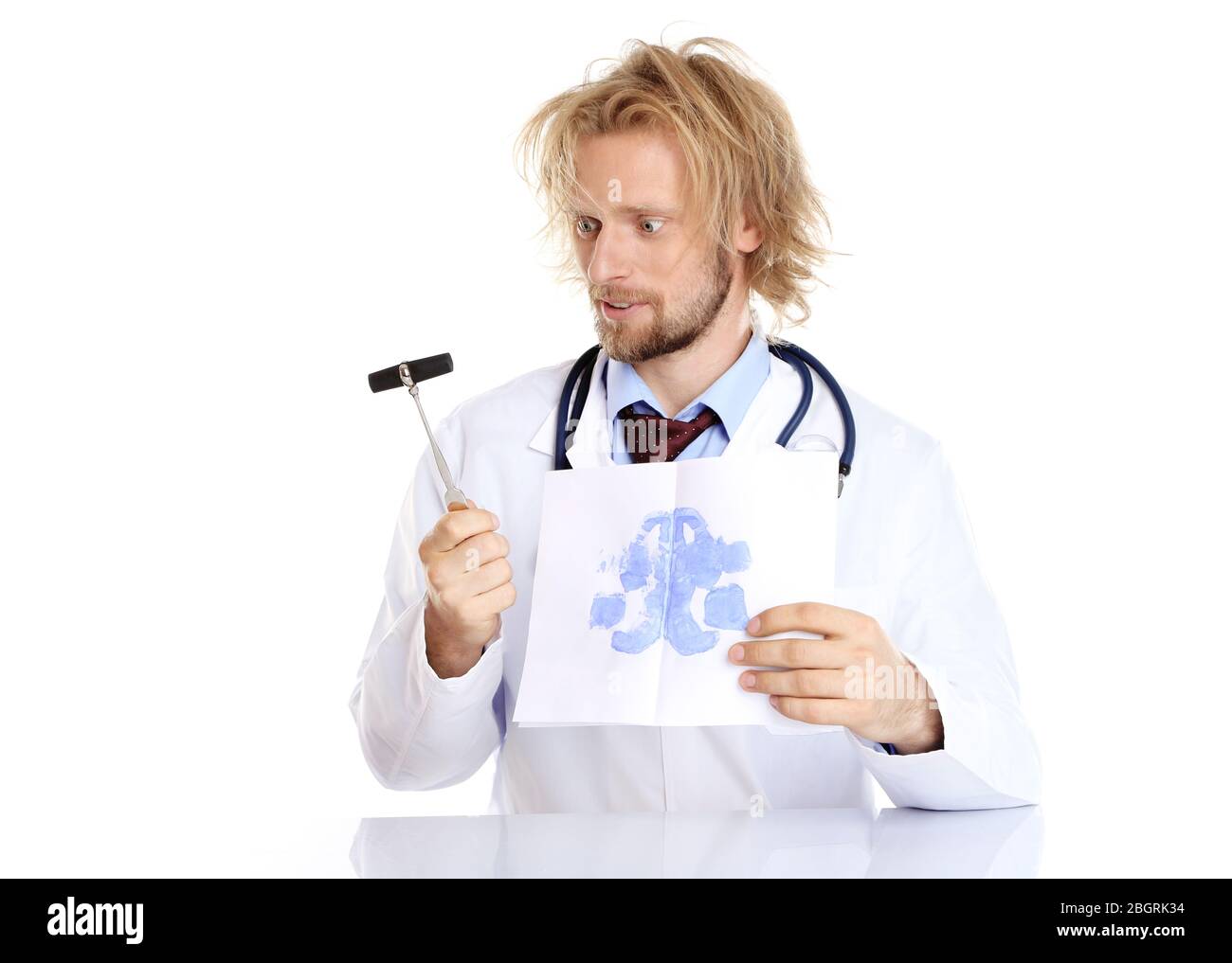 Funny psychotherapist holding Rorschach test Stock Photo - Alamy
