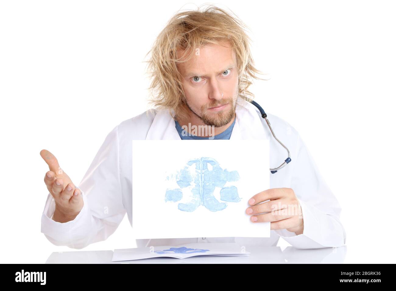 Funny psychotherapist holding Rorschach test Stock Photo - Alamy
