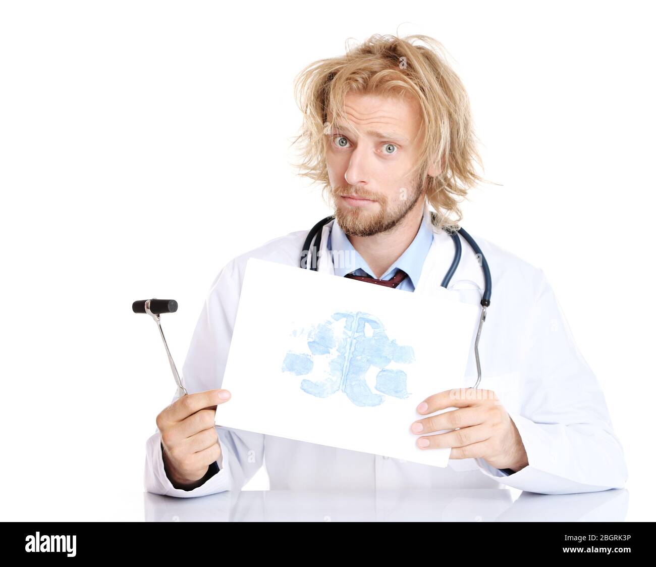 Funny psychotherapist holding Rorschach test Stock Photo - Alamy