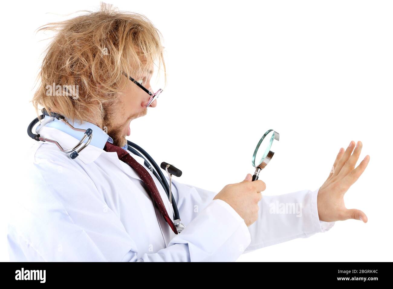 Funny doctor in glasses holding magnifier isolated on white Stock Photo ...
