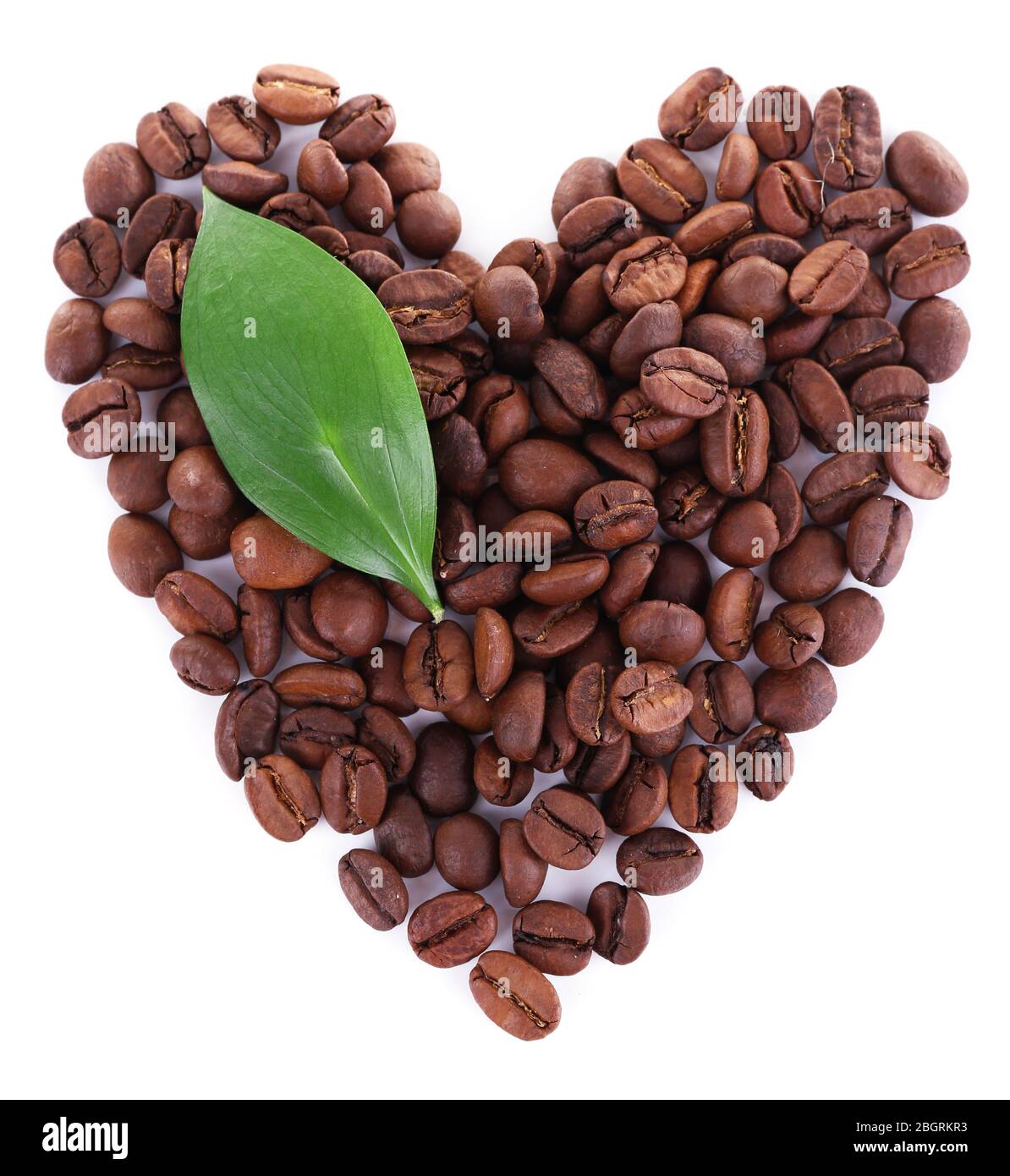 Heart shaped coffee beans isolated on white Stock Photo - Alamy