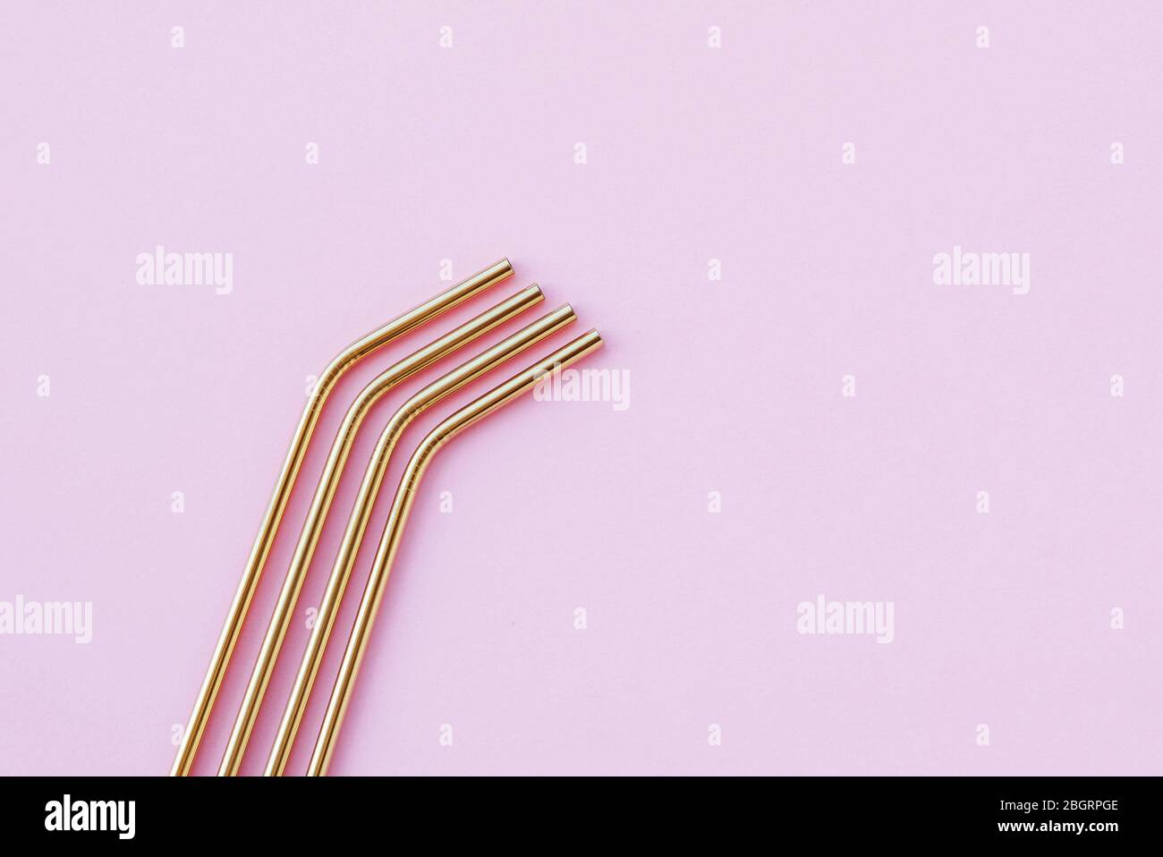Reusable eco-friendly metal straws on pastel pink background Stock ...